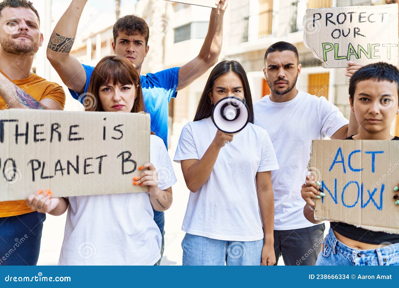 Group of Young Activists Protesting Holding Banner and Using Megaphone ...
