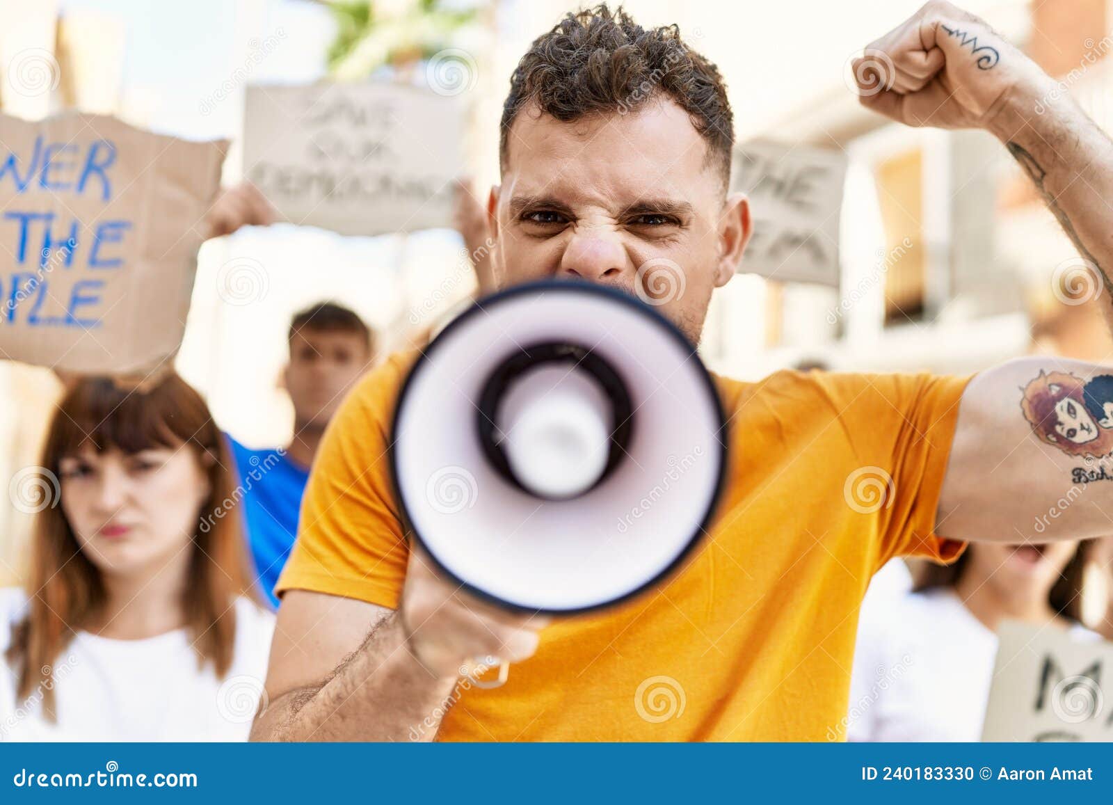 Group of Young Activists Protesting Holding Banner and Using Megaphone ...