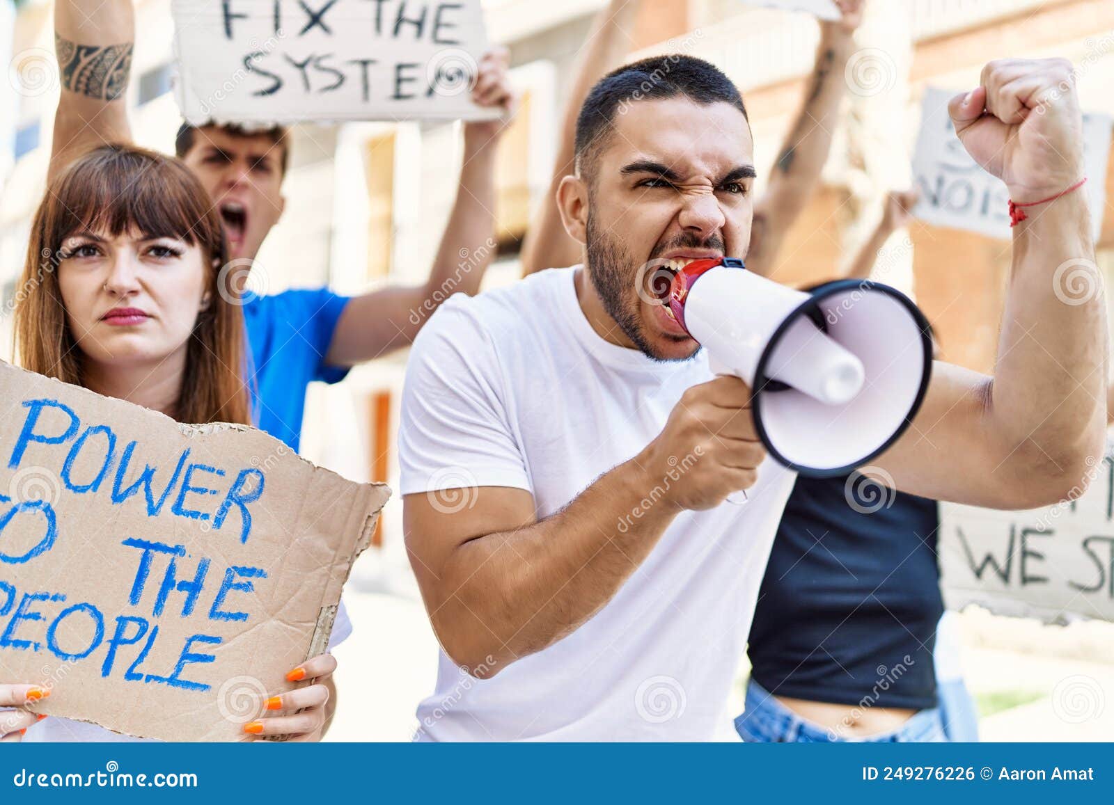 Group of Young Activists Protesting Holding Banner and Using Megaphone ...
