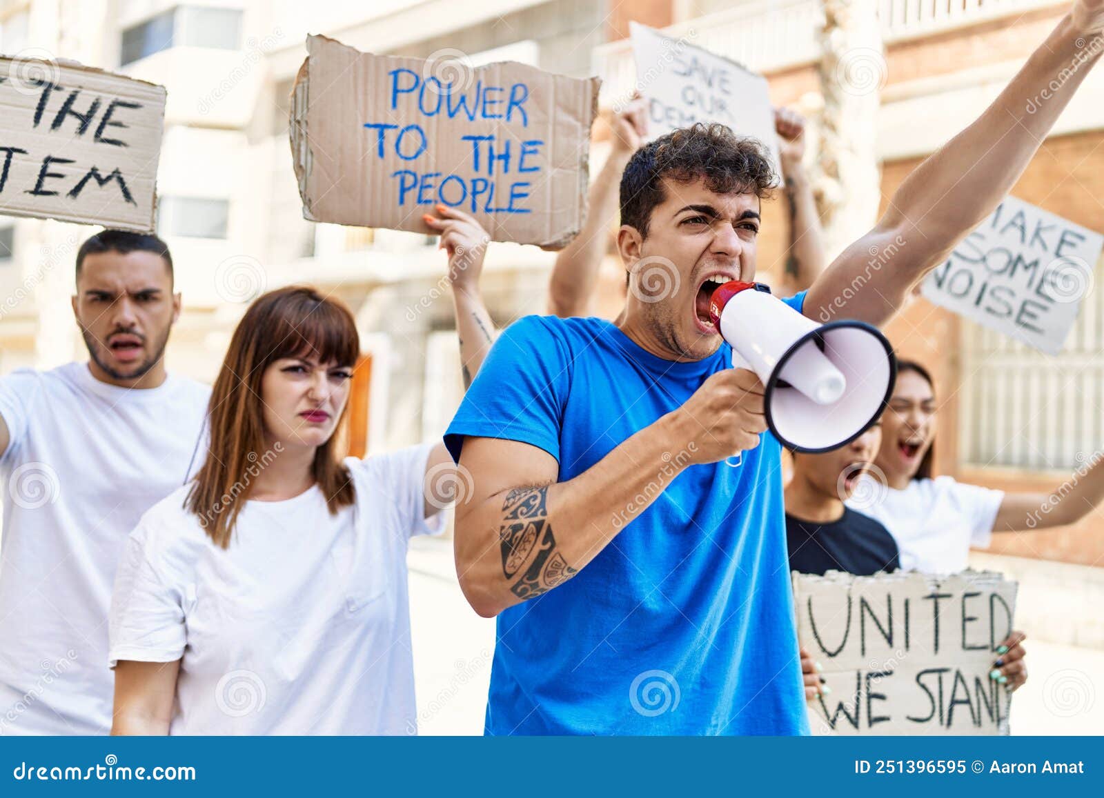 Group of Young Activists Protesting Holding Banner and Using Megaphone ...