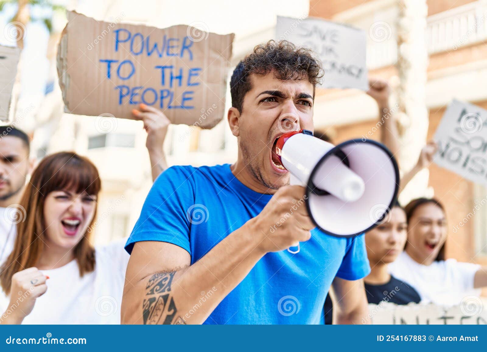 Group of Young Activists Protesting Holding Banner and Using Megaphone ...
