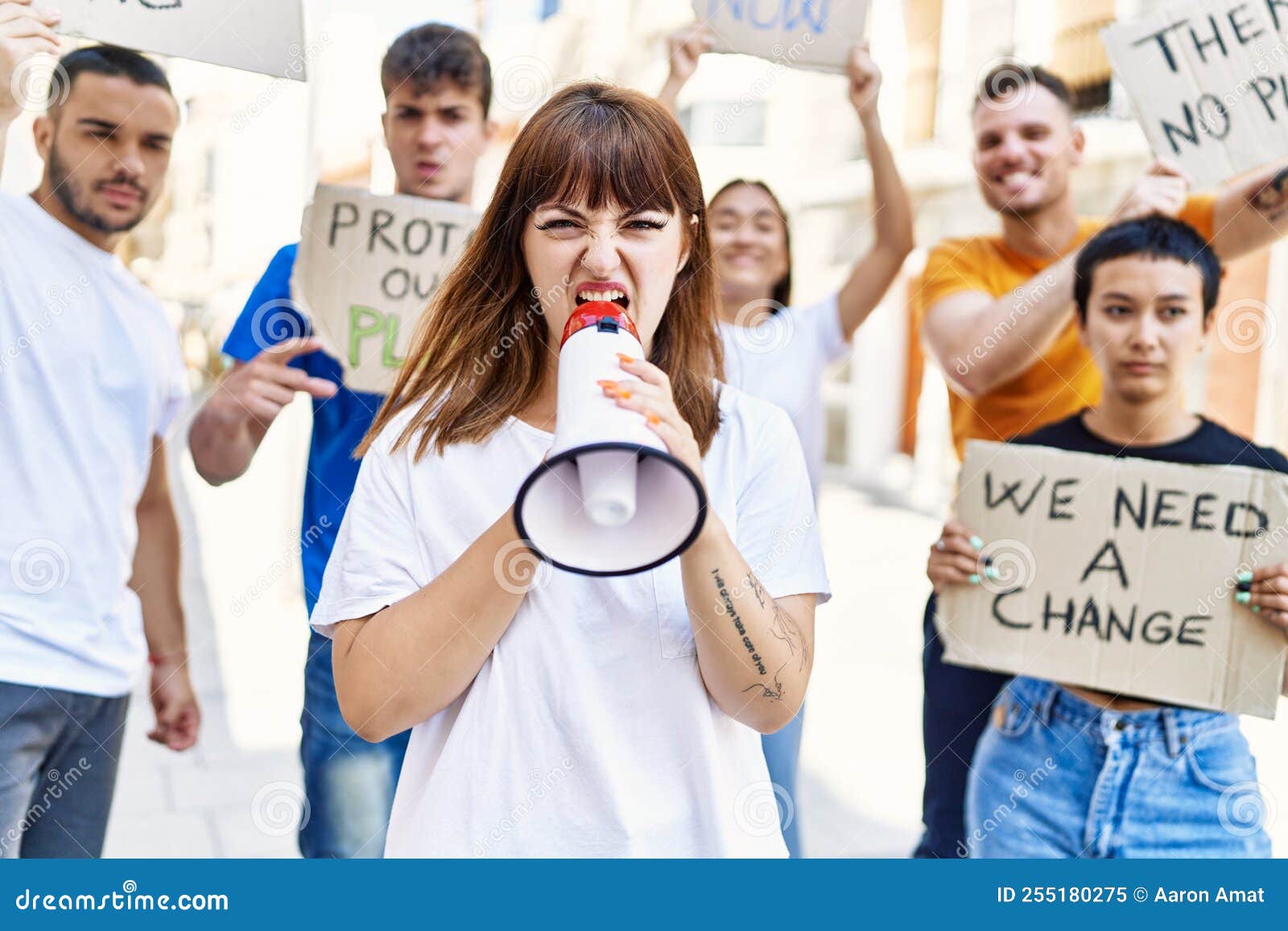 Group of Young Activists Protesting Holding Banner and Using Megaphone ...