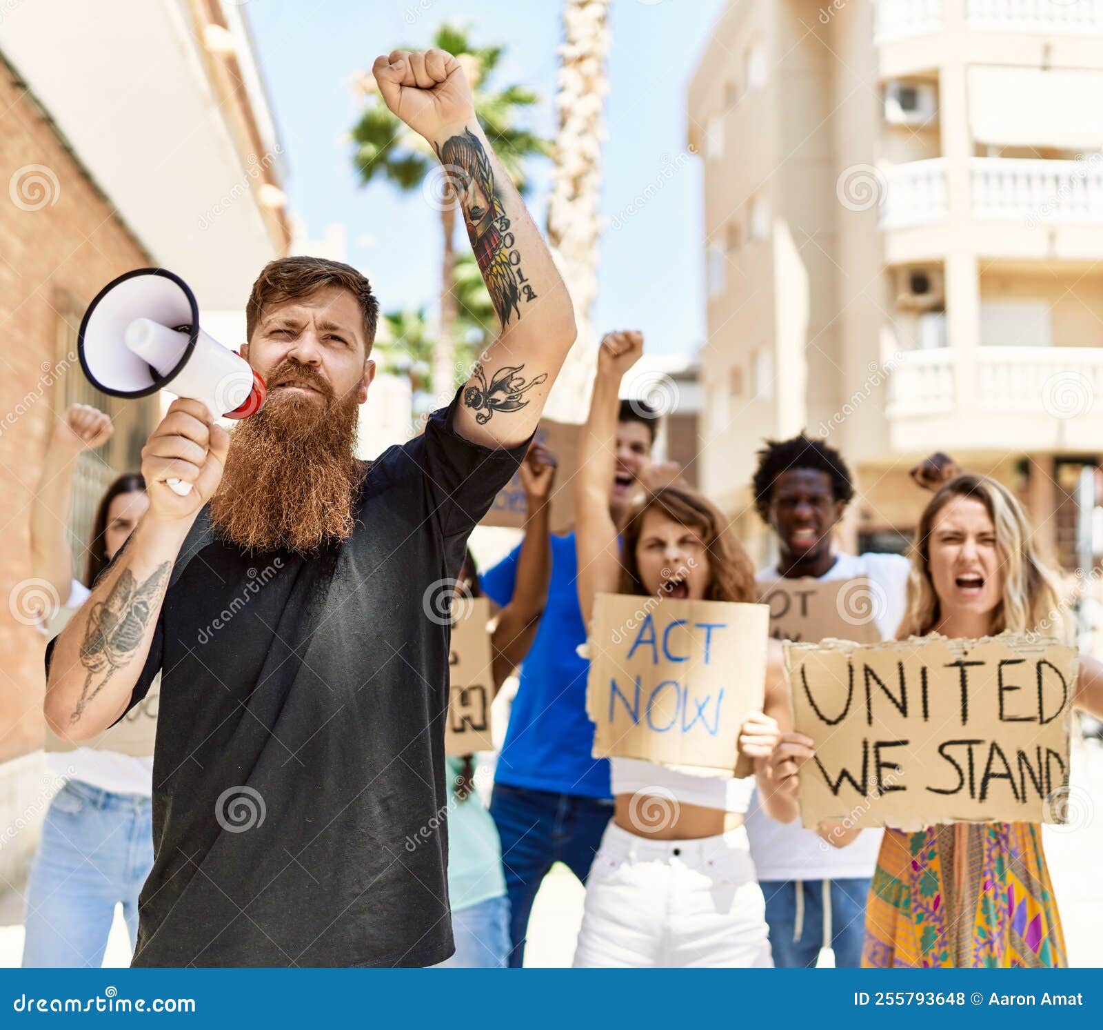 Group of Young Activists Protesting Holding Banner and Using Megaphone ...