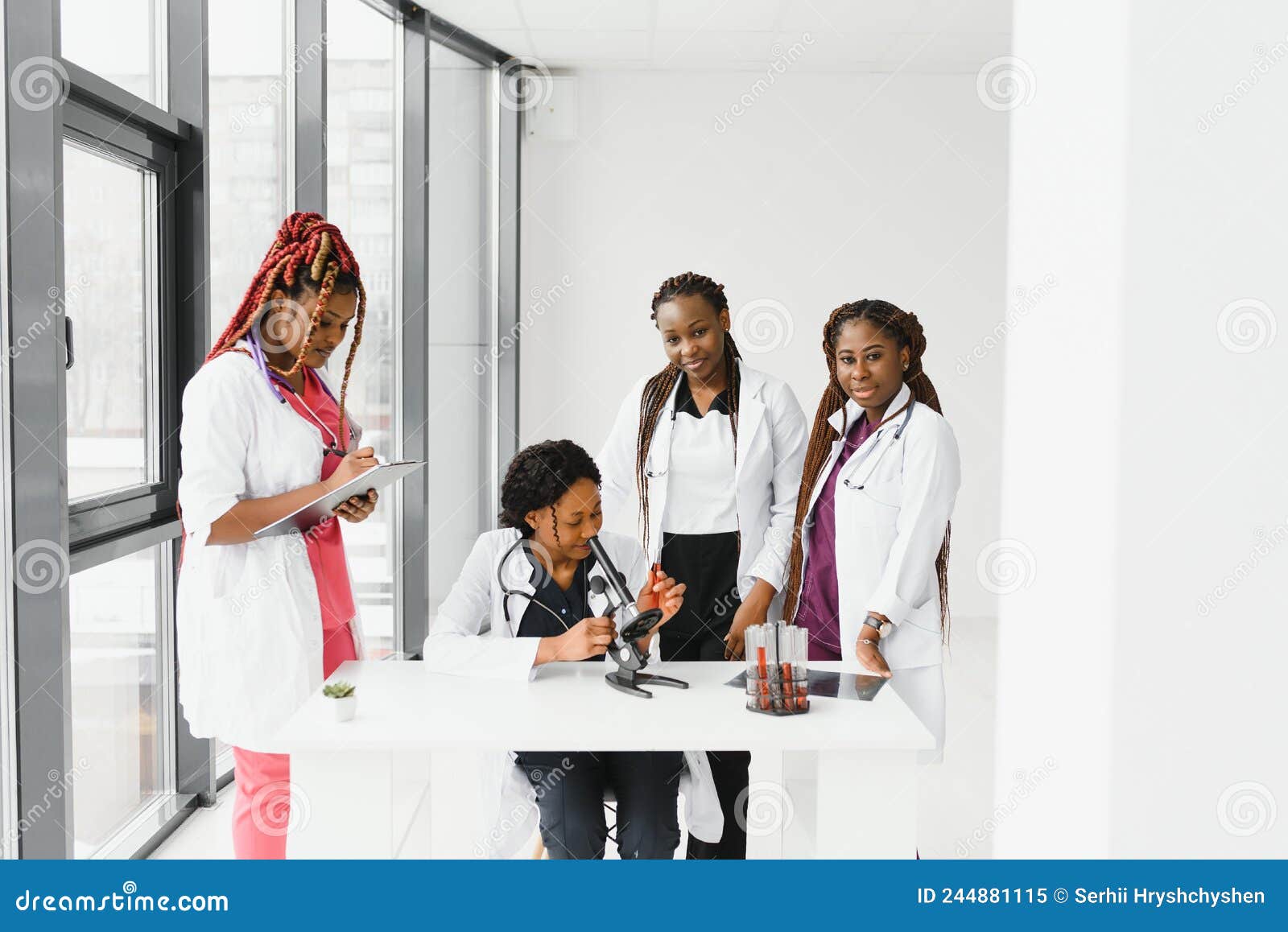 Group of Young African Medical Workers on White Background. Stock Image ...