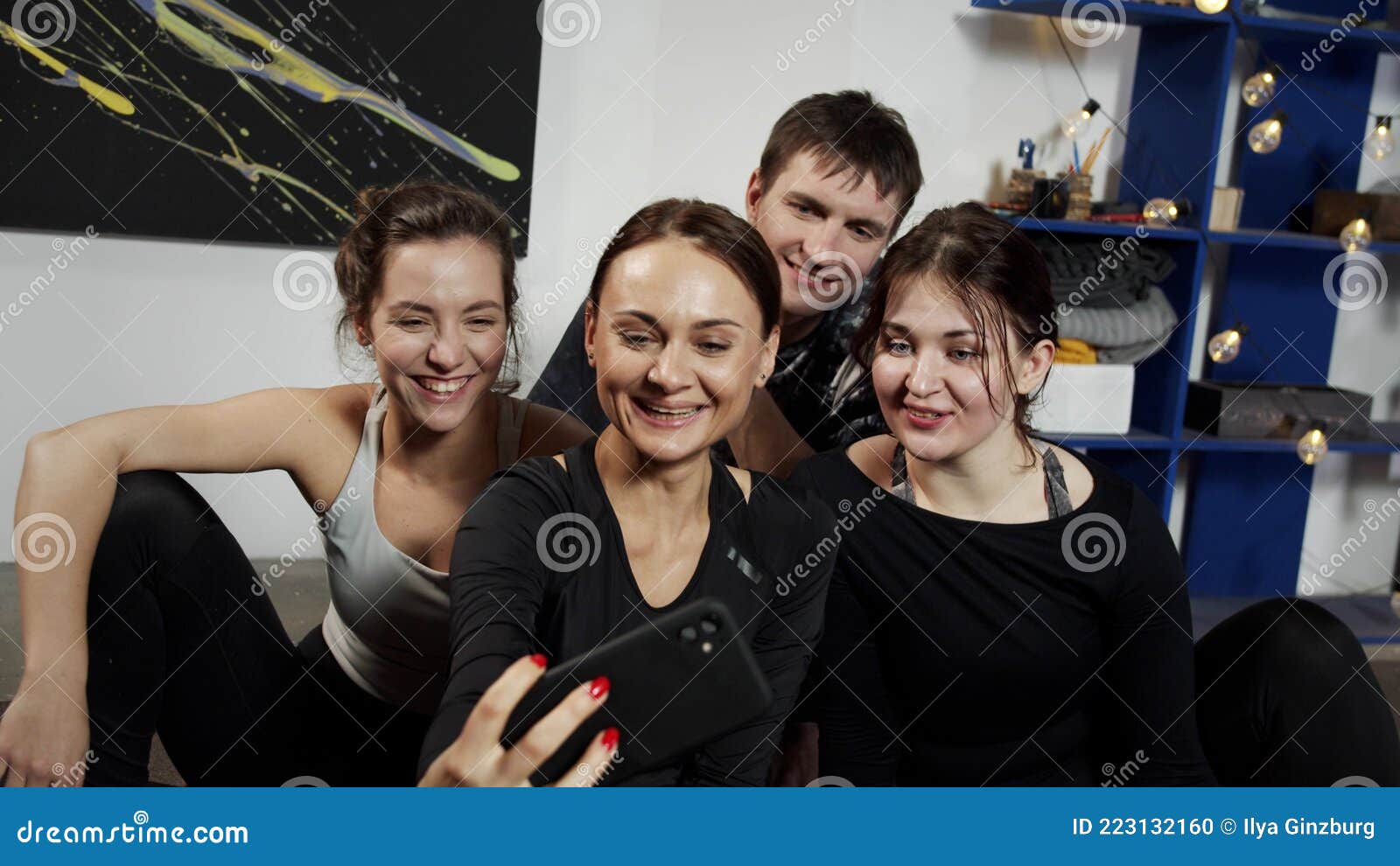 Group of Young Attractive People Watching Video Tutorial Together Stock ...