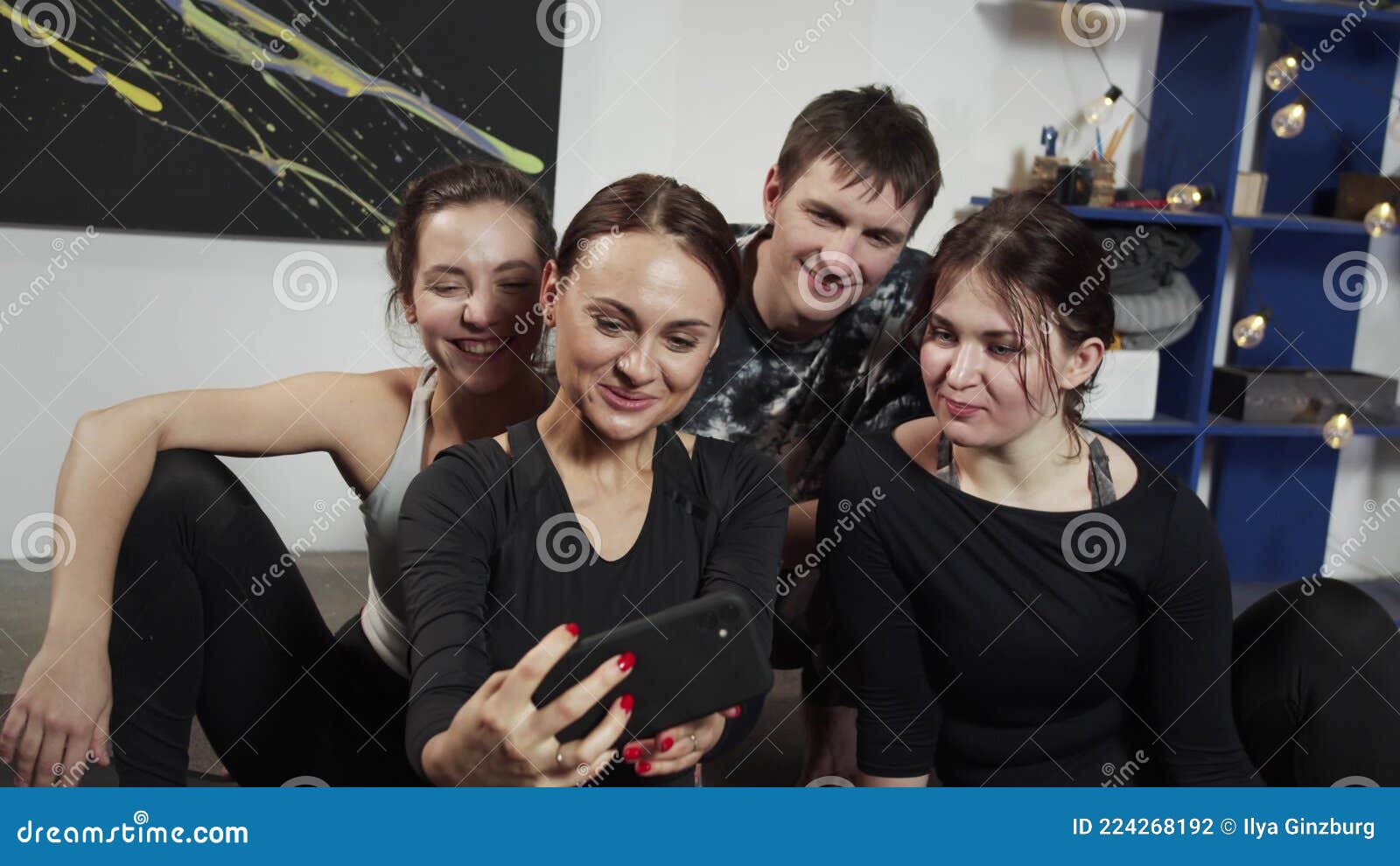 Group of Young Attractive People Watching Video Tutorial Together Stock ...