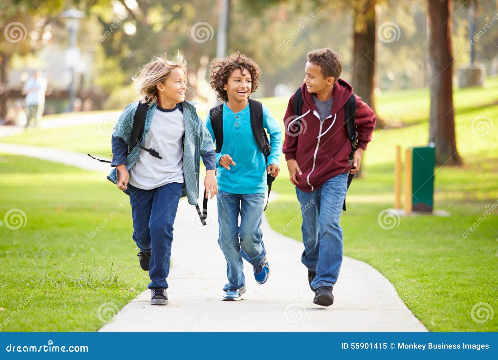 Group of Young Boys Running Towards Camera in Park Stock Image - Image ...