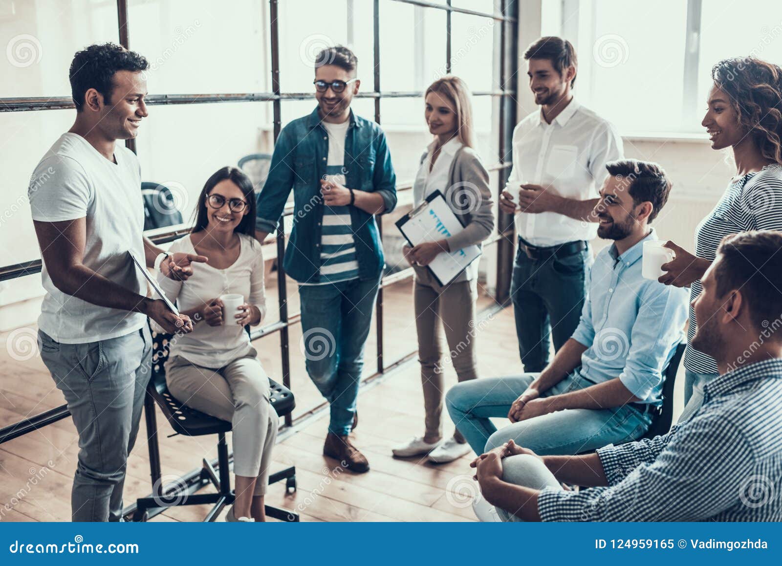 Group of Young Business People on Break in Office Stock Image - Image ... Group of Young Business People on Break in Office Stock Image - Image ...