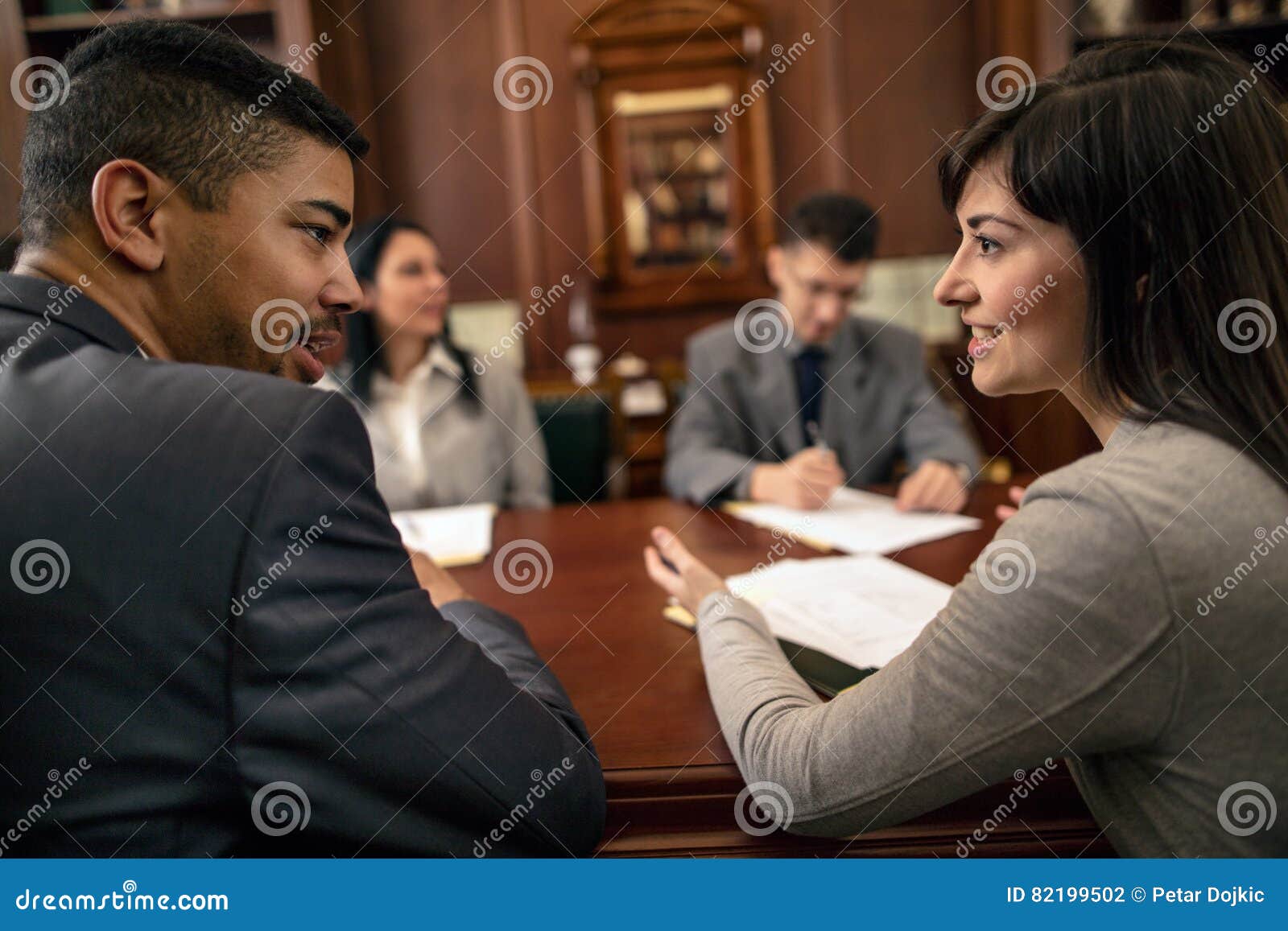 Group Of Young Business People Or Lawyers - Meeting In An Office Stock ... Group Of Young Business People Or Lawyers - Meeting In An Office Stock ...