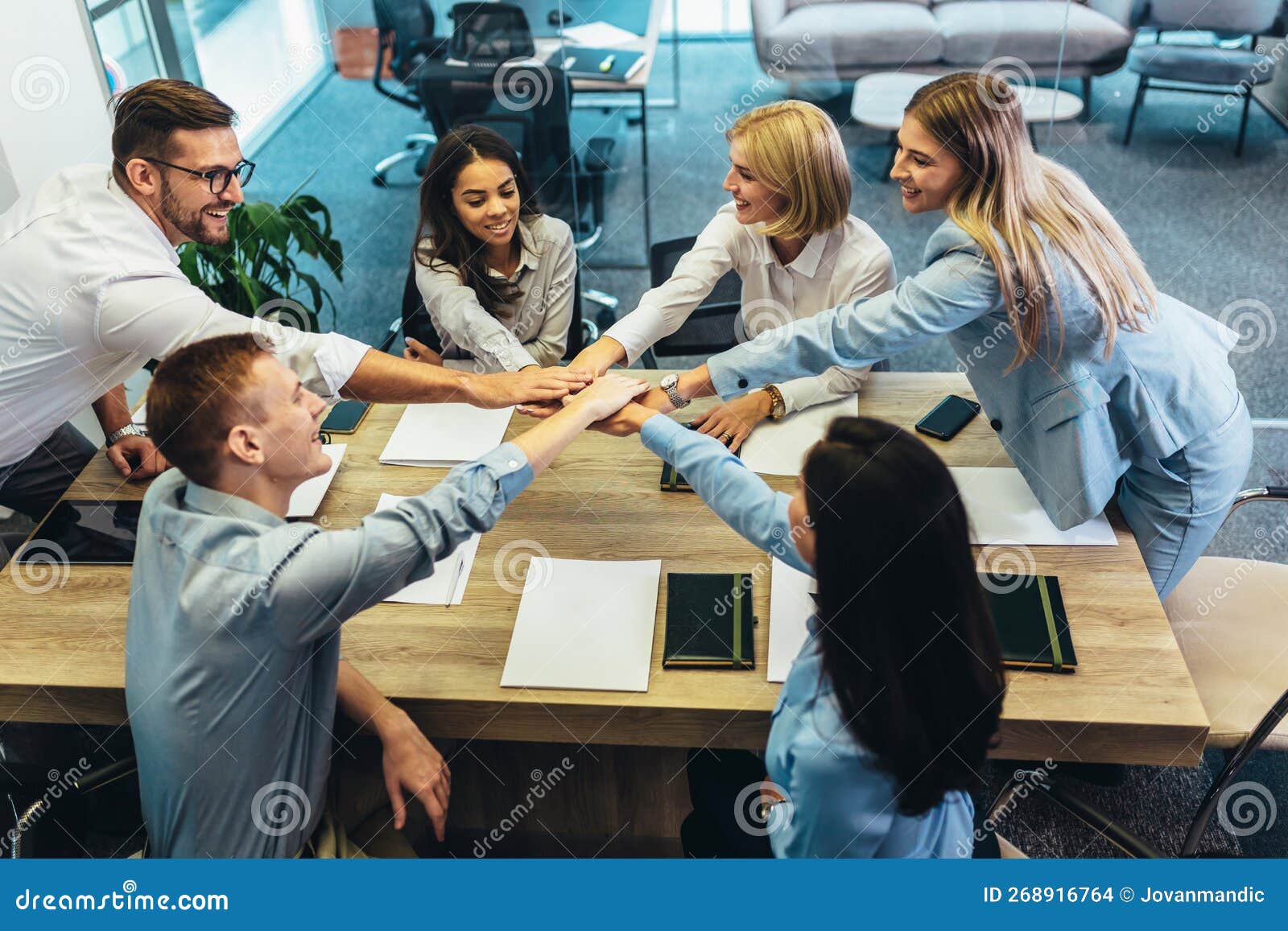 Young Business People Showing Their Unity Stock Photo - Image of office ...