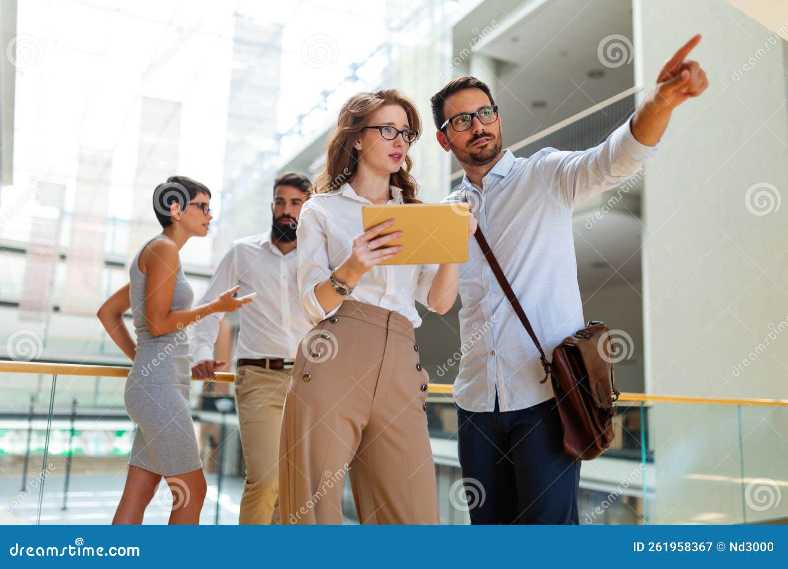 Group of Young Business People Working and Communicating at the Office ...