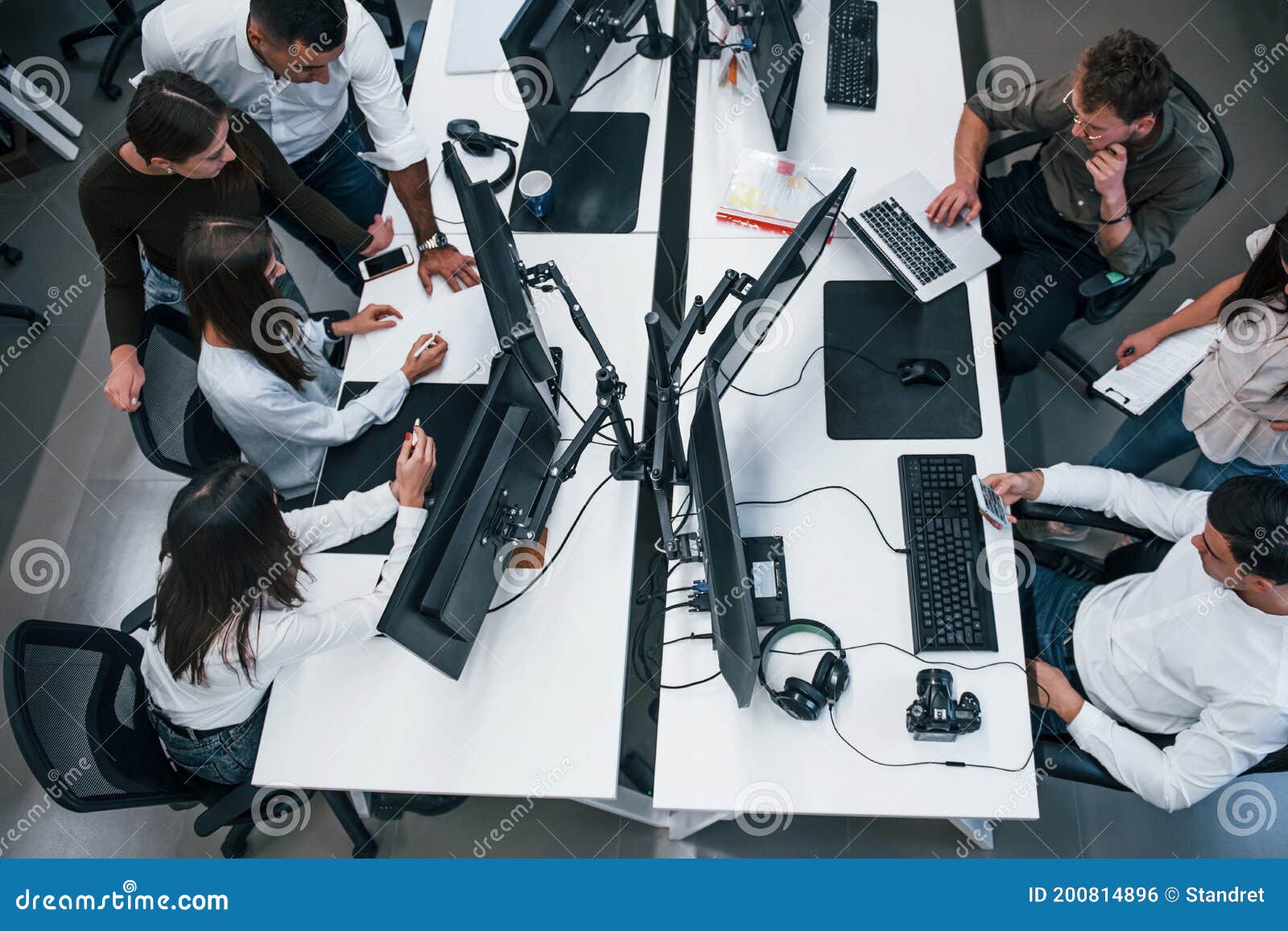 Group of Young Business People that Working by Computers in the Modern ...