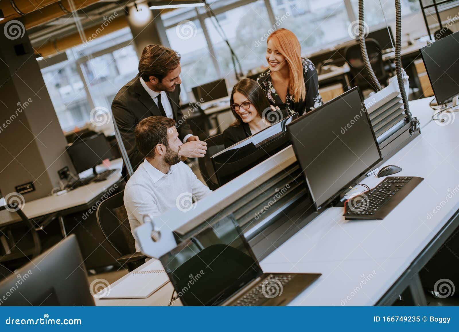 Group of Young Business People are Working Together with Desktop ...