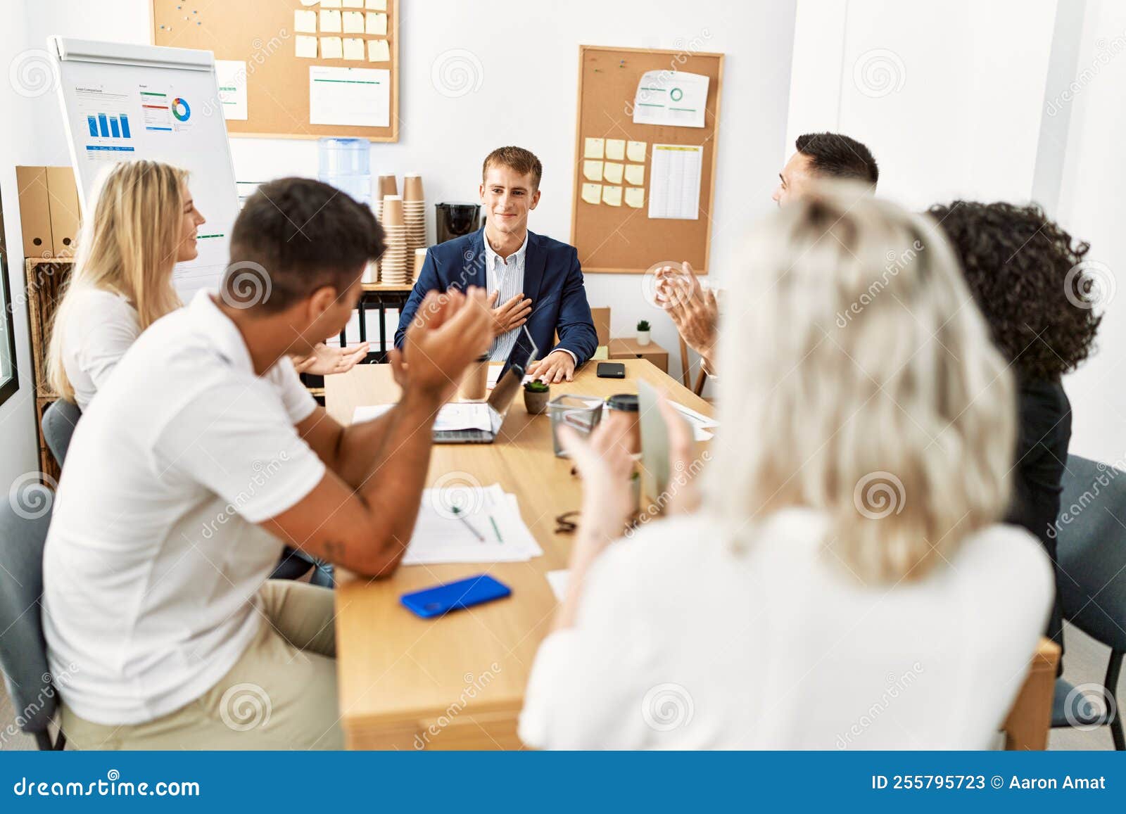 Group of Young Business Workers Smiling and Clapping To Partner at the ...