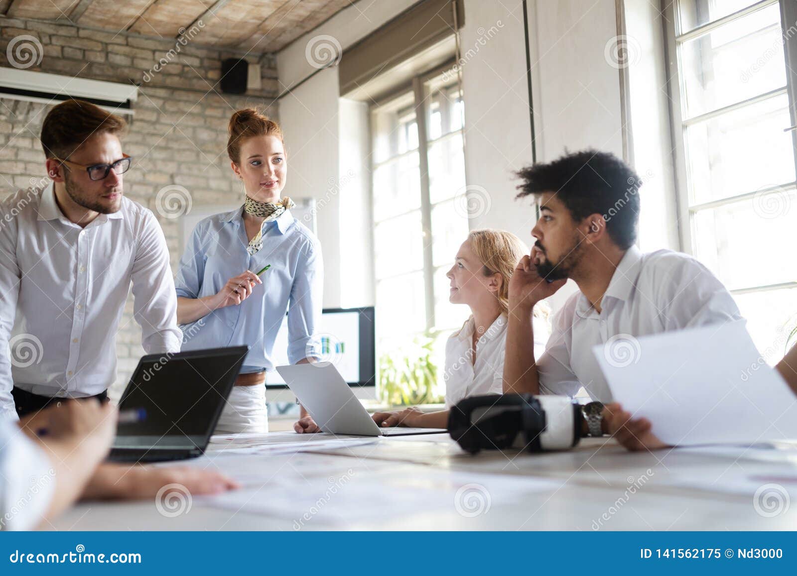 Group of Young Businesspeople or Designers Work with New Startup ...