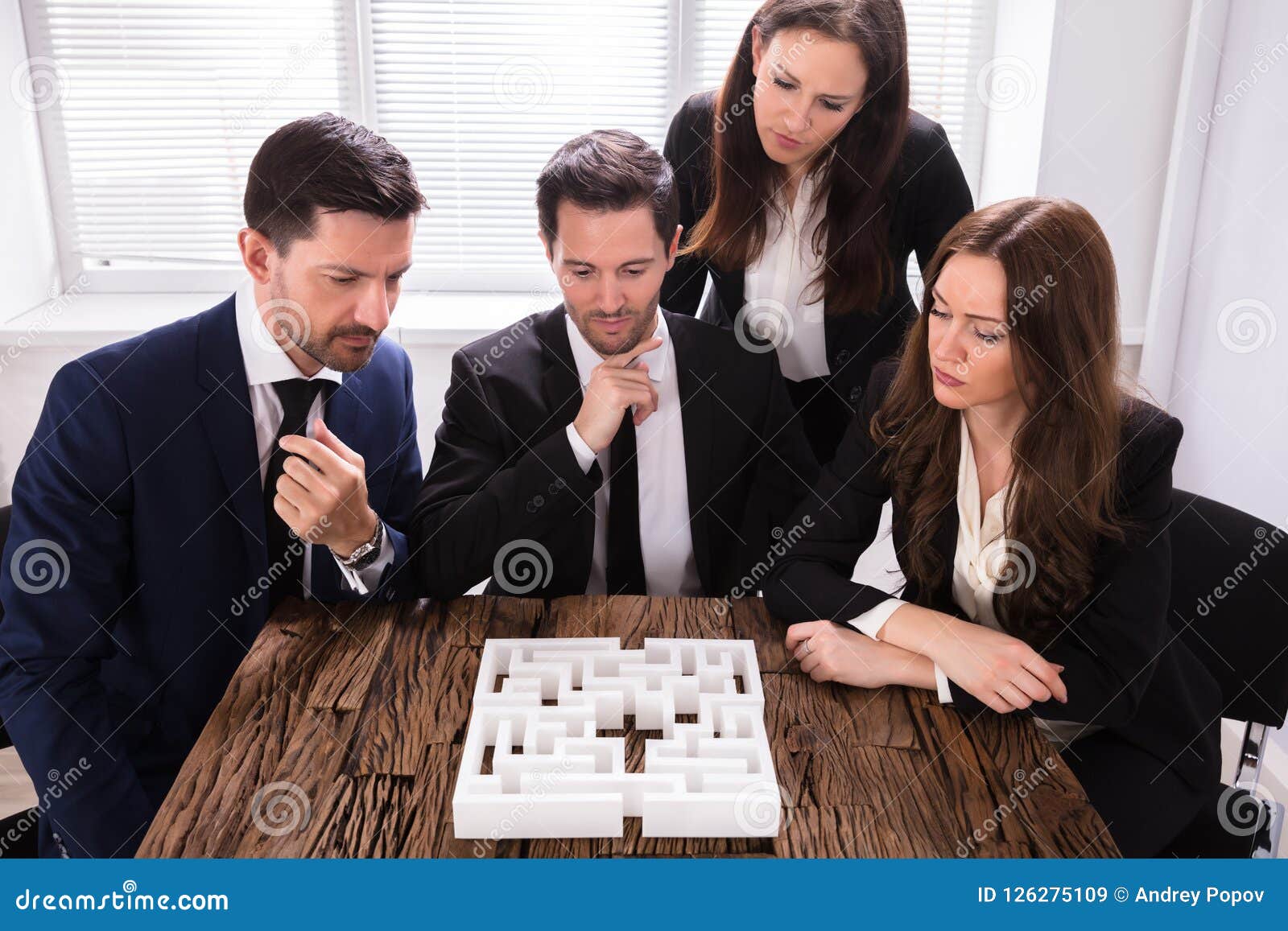 Businesspeople Trying To Solve Maze Puzzle Stock Image - Image of ... Businesspeople Trying To Solve Maze Puzzle Stock Image - Image of ...