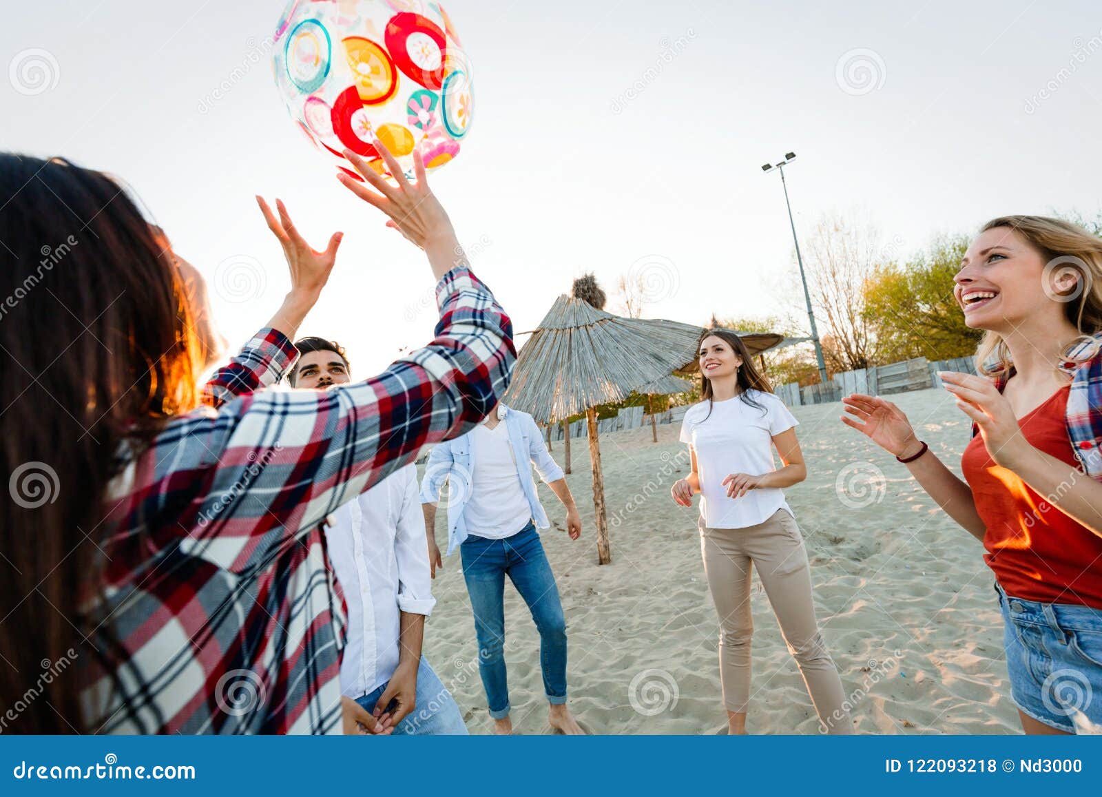 Group of Young Cheerful Friends Playing with Ball Stock Photo - Image ...