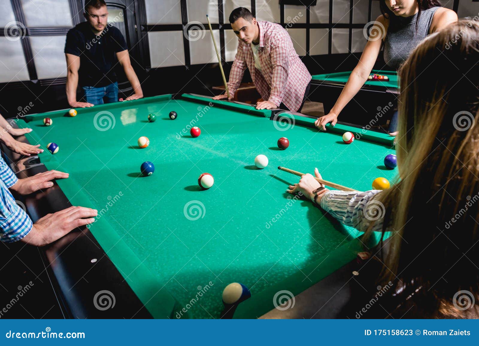 Group of Young Cheerful Friends Playing Billiards. Stock Image - Image ...