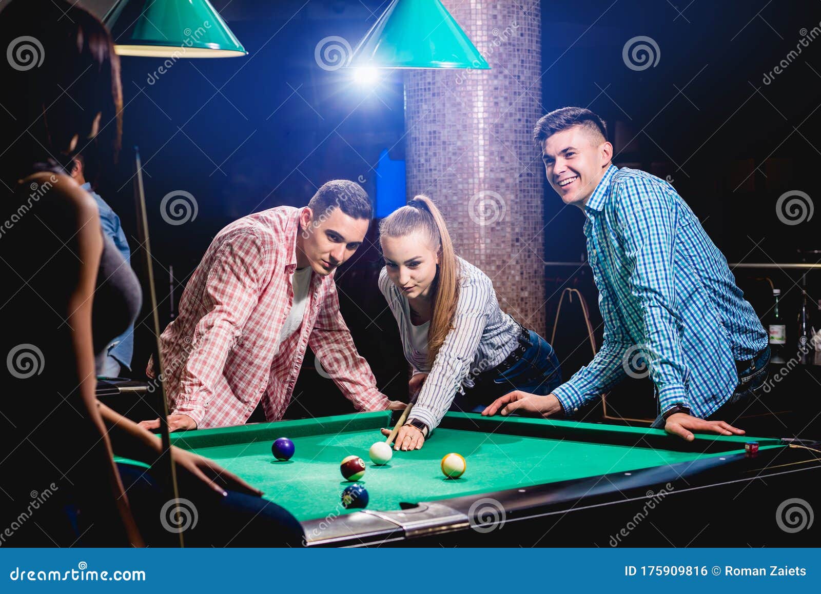 Group of Young Cheerful Friends Playing Billiards. Stock Photo - Image ...