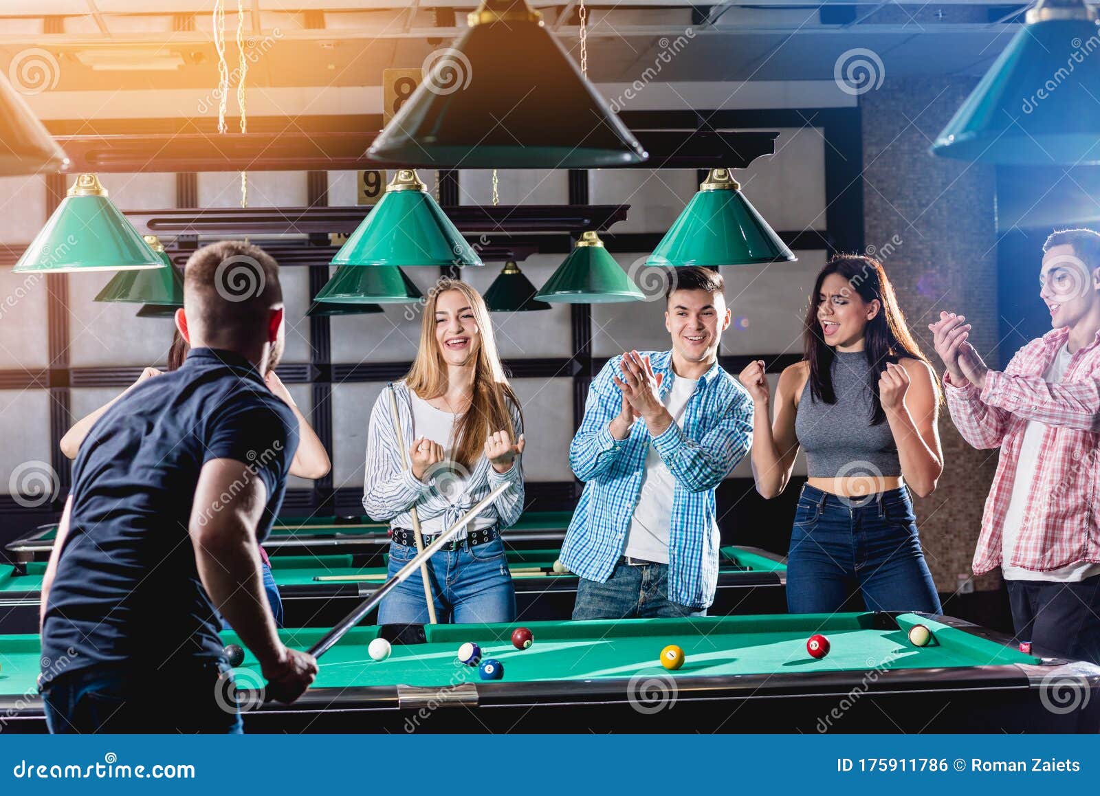 Group of Young Cheerful Friends Playing Billiards. Stock Photo - Image ...