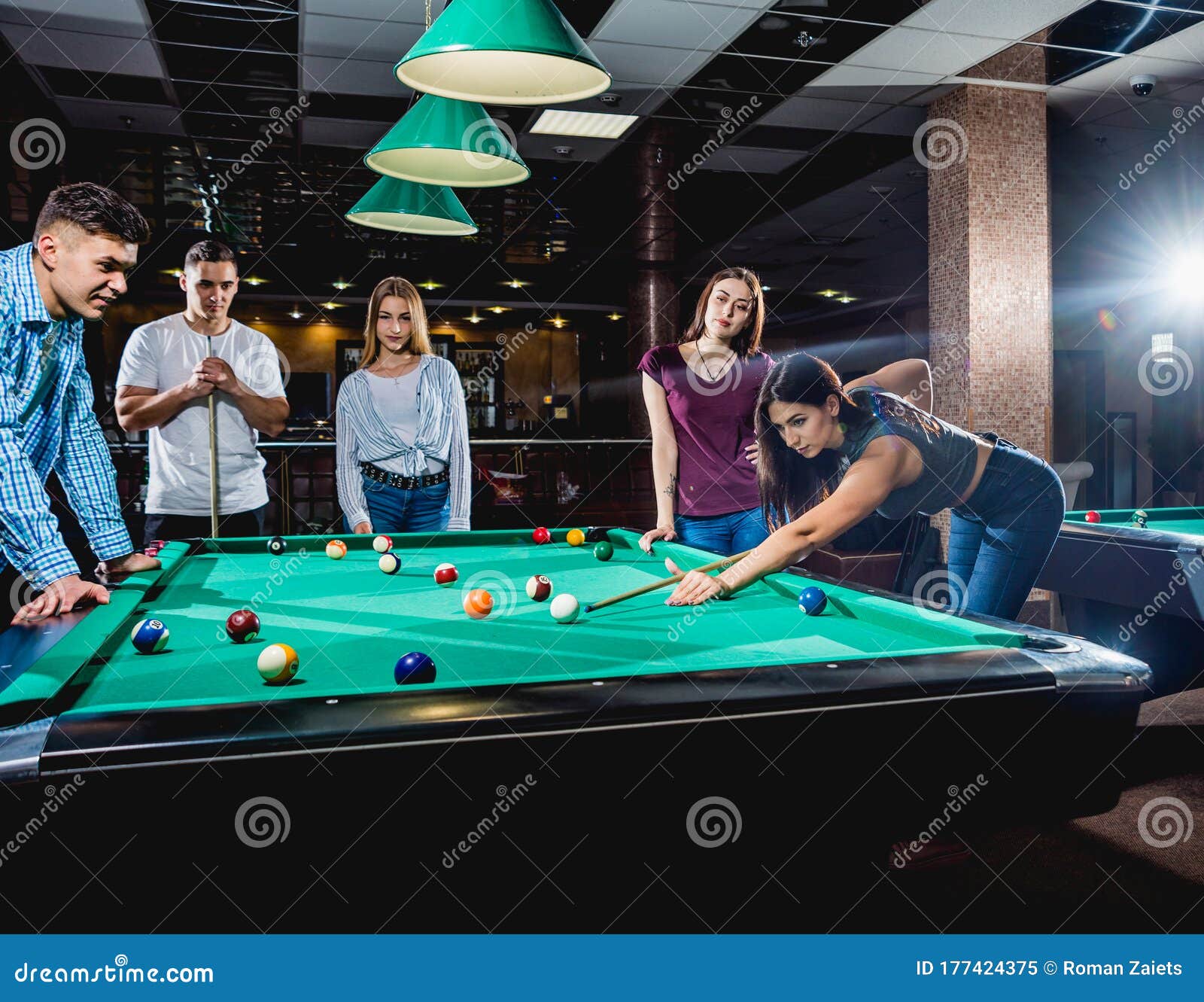 Group of Young Cheerful Friends Playing Billiards. Stock Image - Image ...