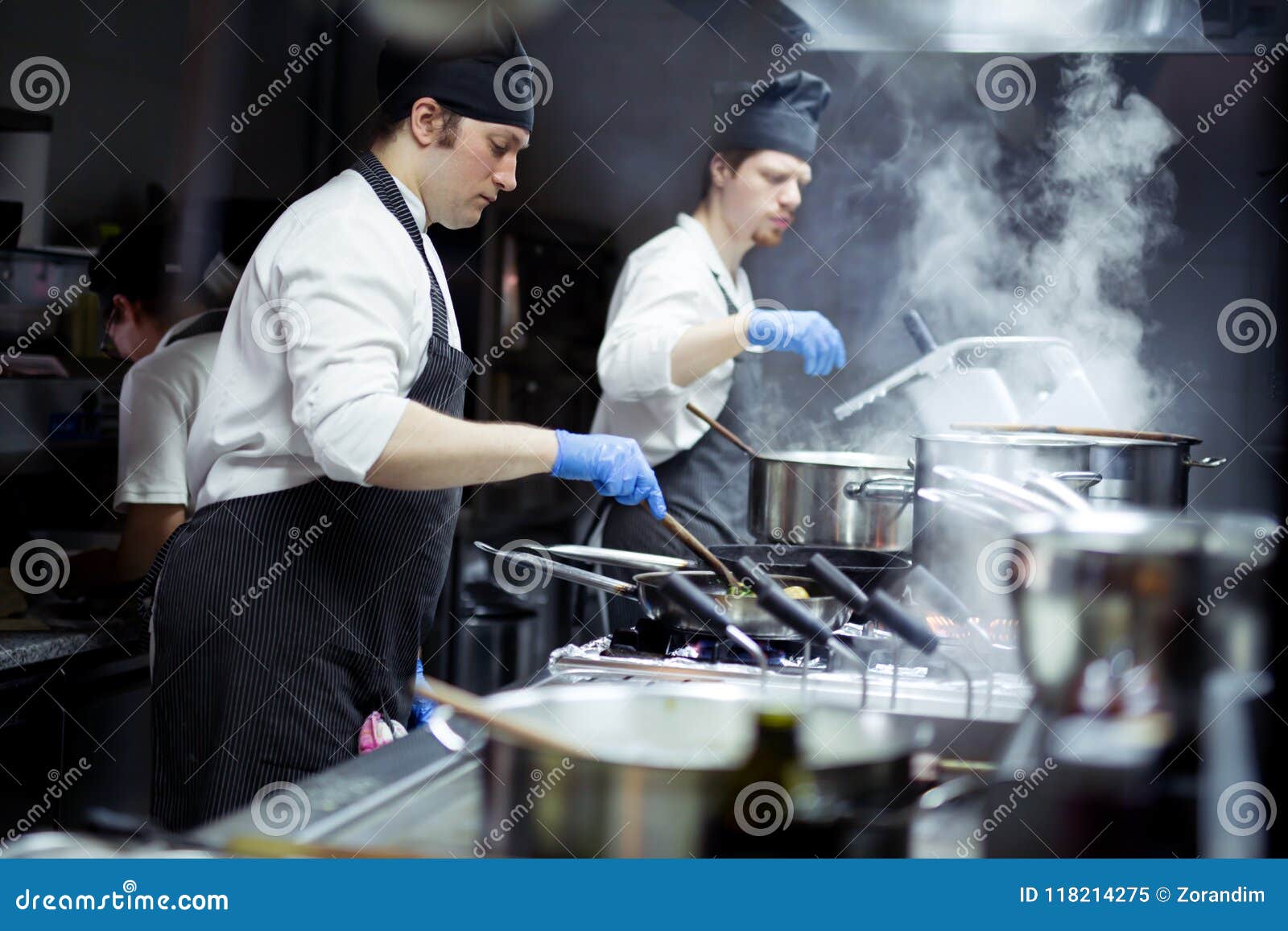 Group of Chefs Working in the Kitchen Stock Image - Image of machine ...