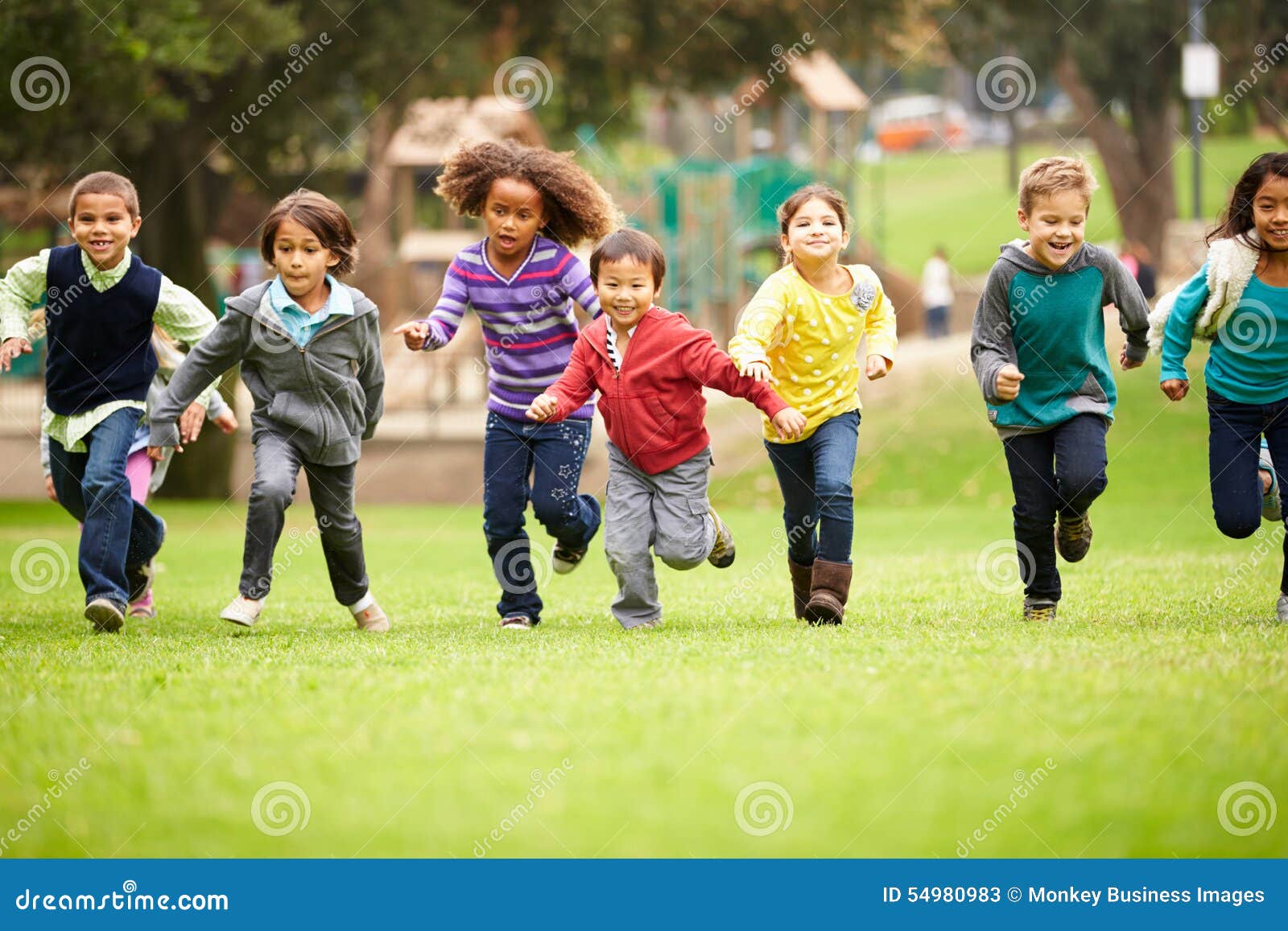 Group of Young Children Running Towards Camera in Park Stock Image ...