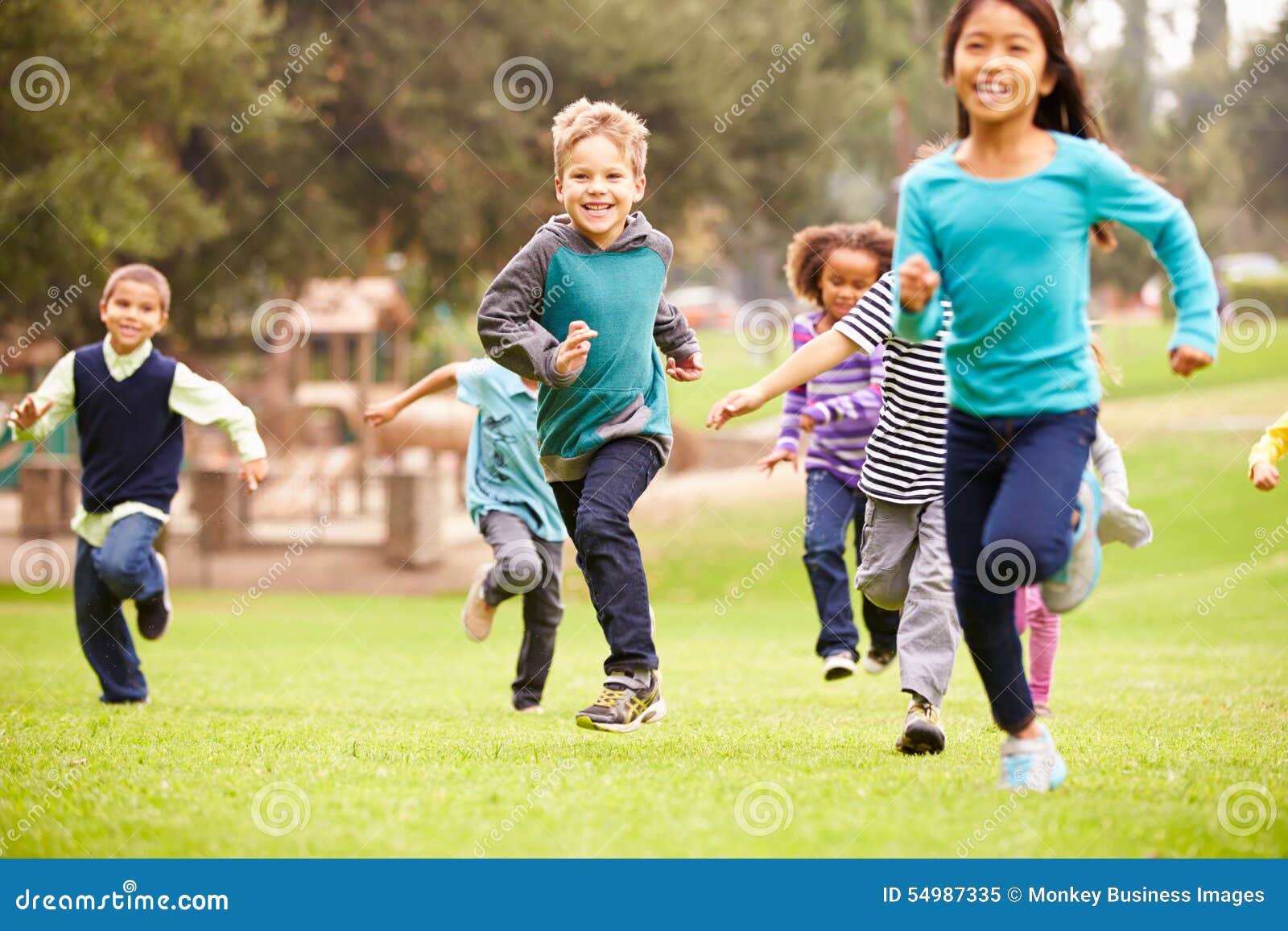 Group of Young Children Running Towards Camera in Park Stock Image ...