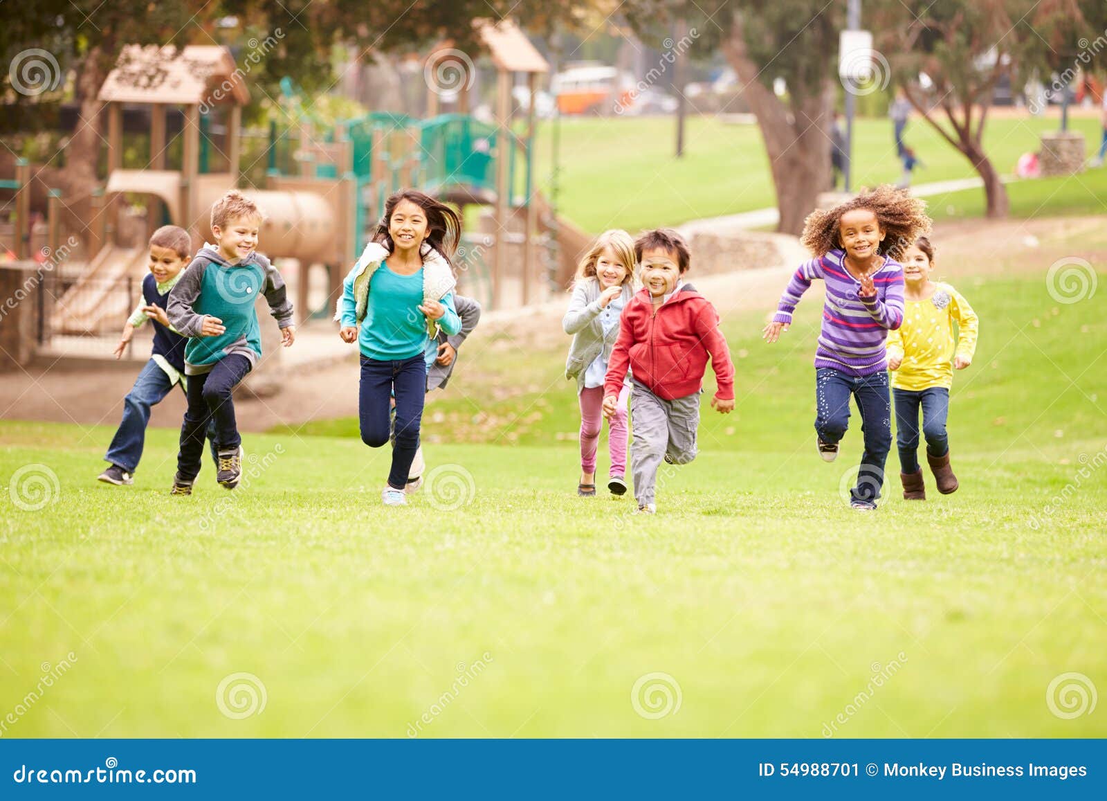 Group of Young Children Running Towards Camera in Park Stock Image ...
