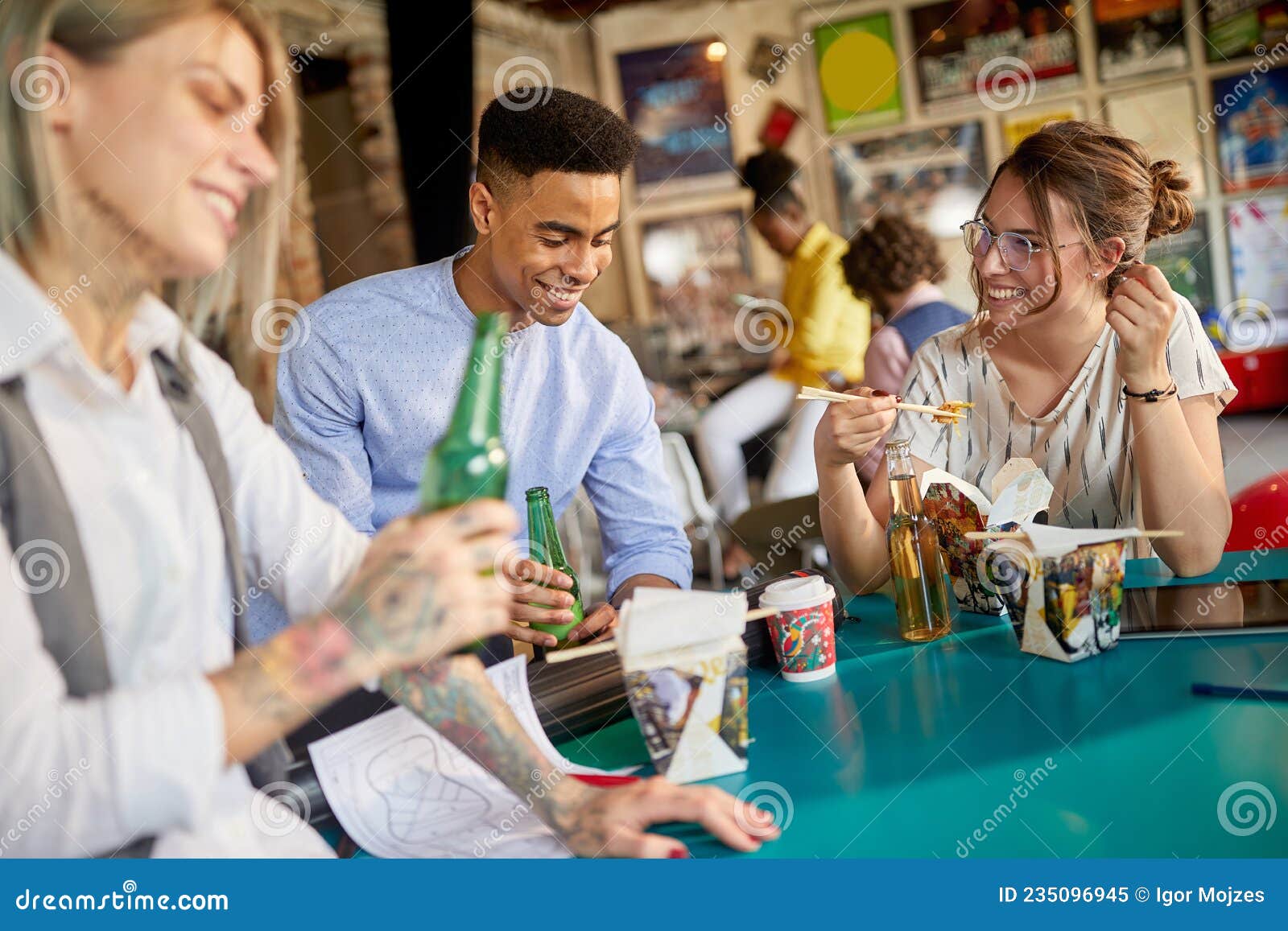 Group of Young Colleagues Eating Together Stock Image - Image of office ...
