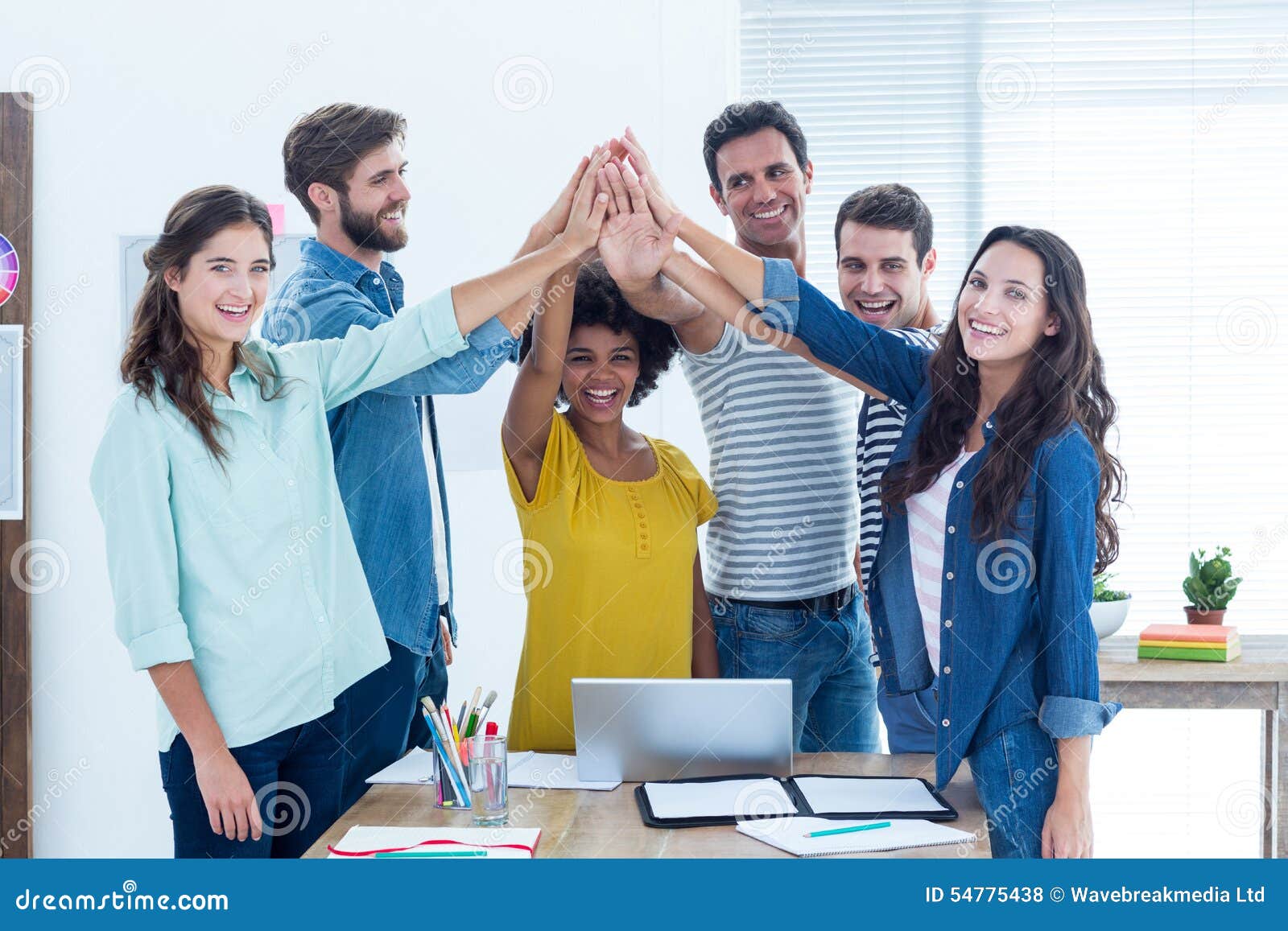 Group of Young Colleagues Using Laptop Stock Photo - Image of career ...