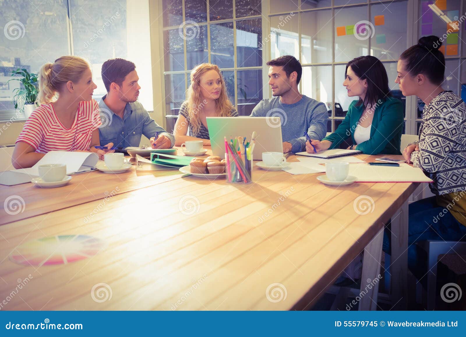 Group of Young Colleagues Using Laptop Stock Image - Image of desk ...