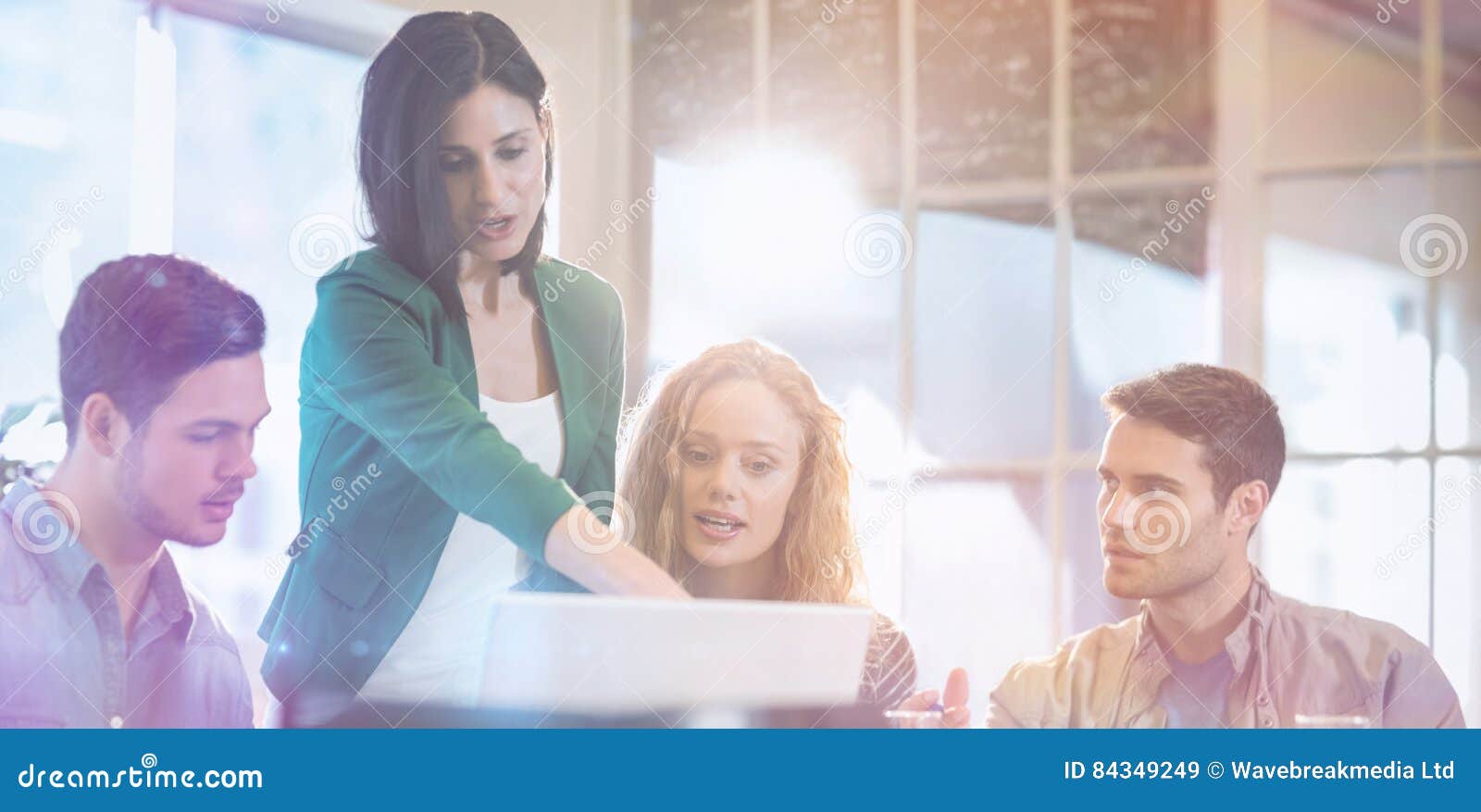 Group of Young Colleagues Using Laptop Stock Image - Image of adult ...