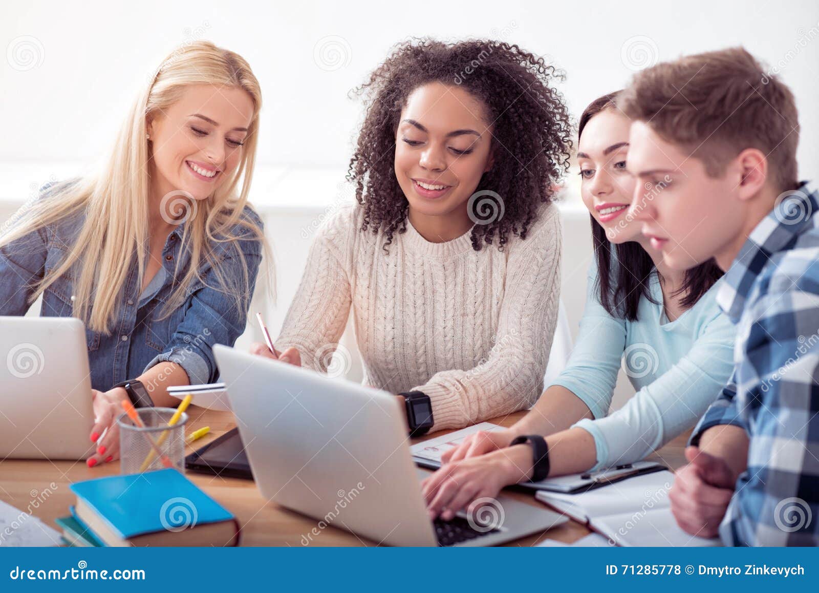 Group of Young and Content Students Using Modern Technologies Stock ...