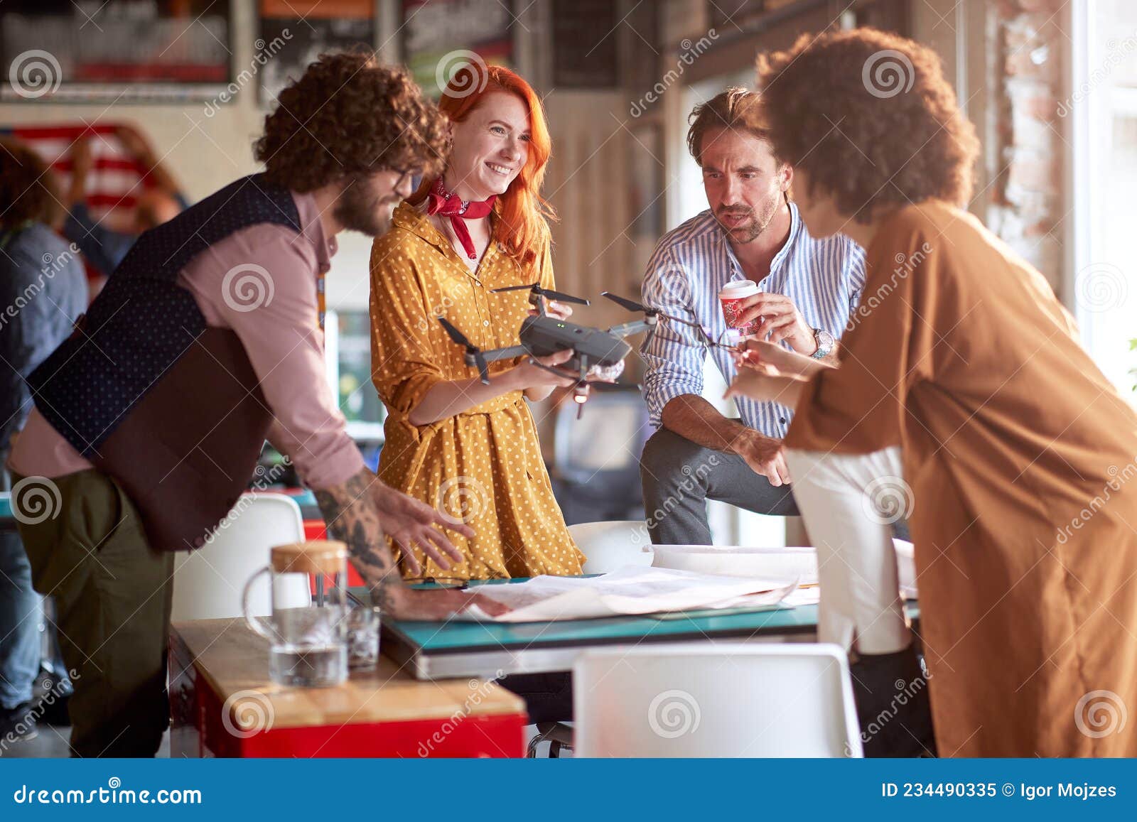 A Group of Young Creative People in the Office are Happy because of a ...