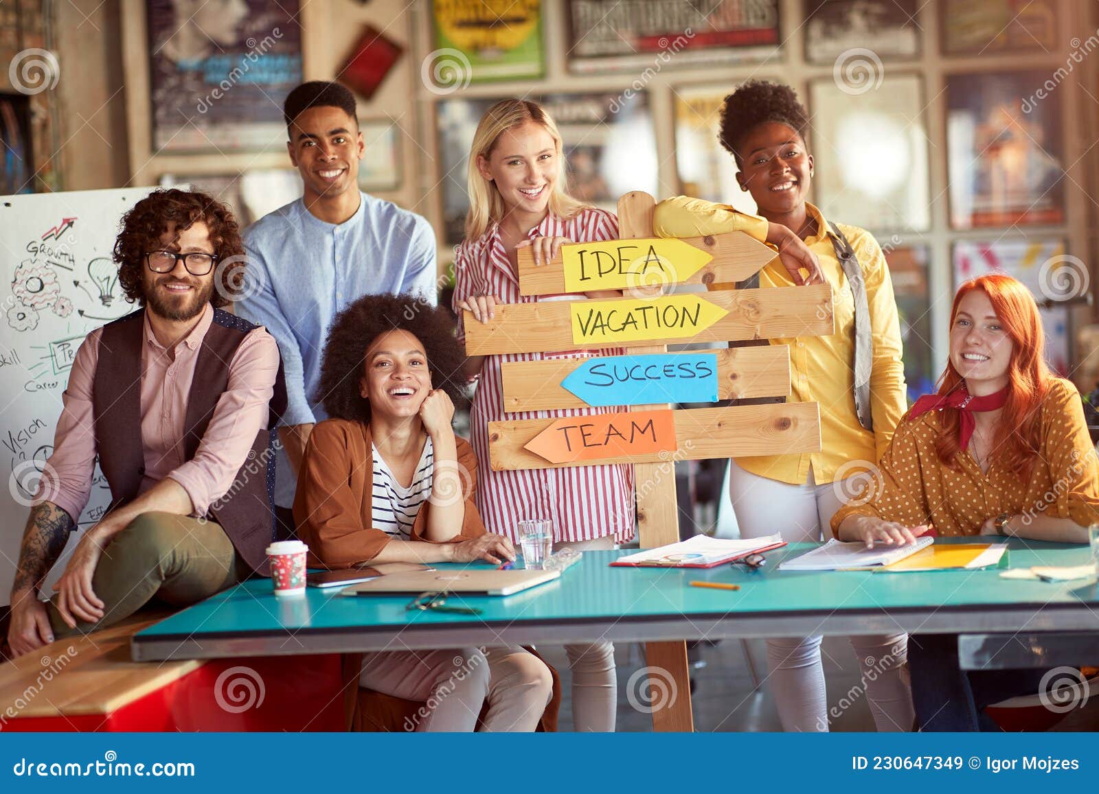 Group of Young Creative People is Posing for a Photo at Their Workplace ...