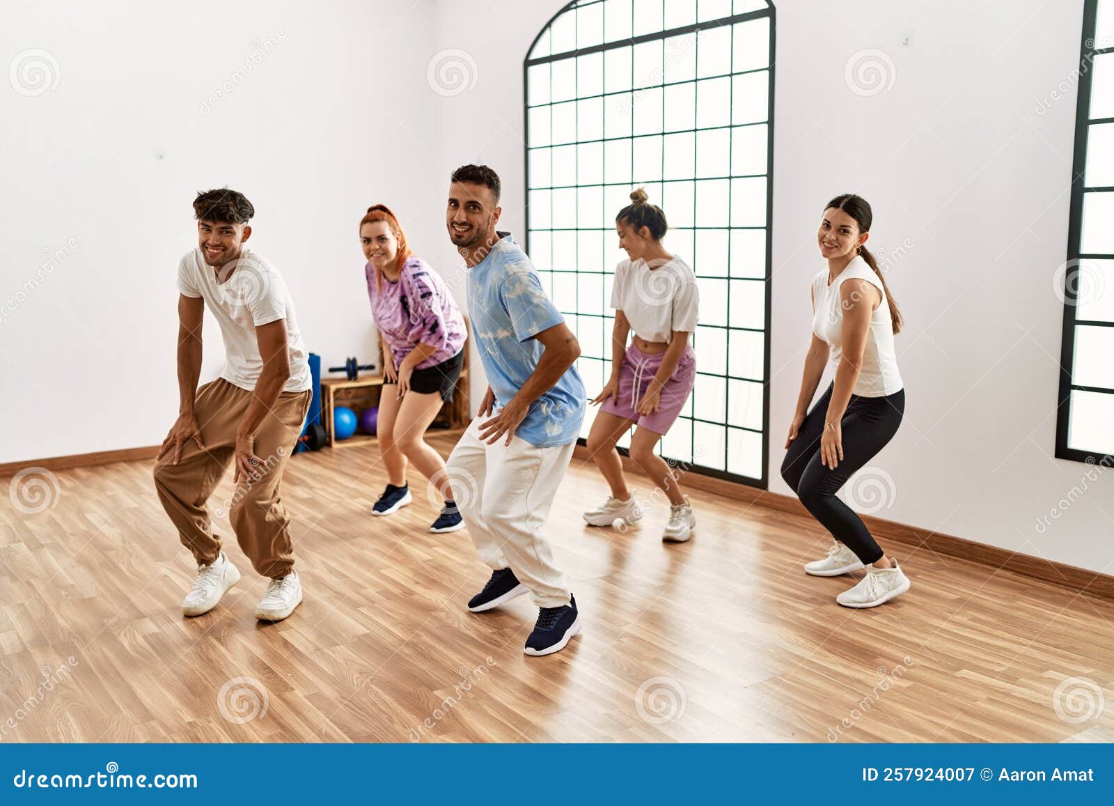 Group of Young Dancer Smiling Happy Dancing Choreography at Dance ...