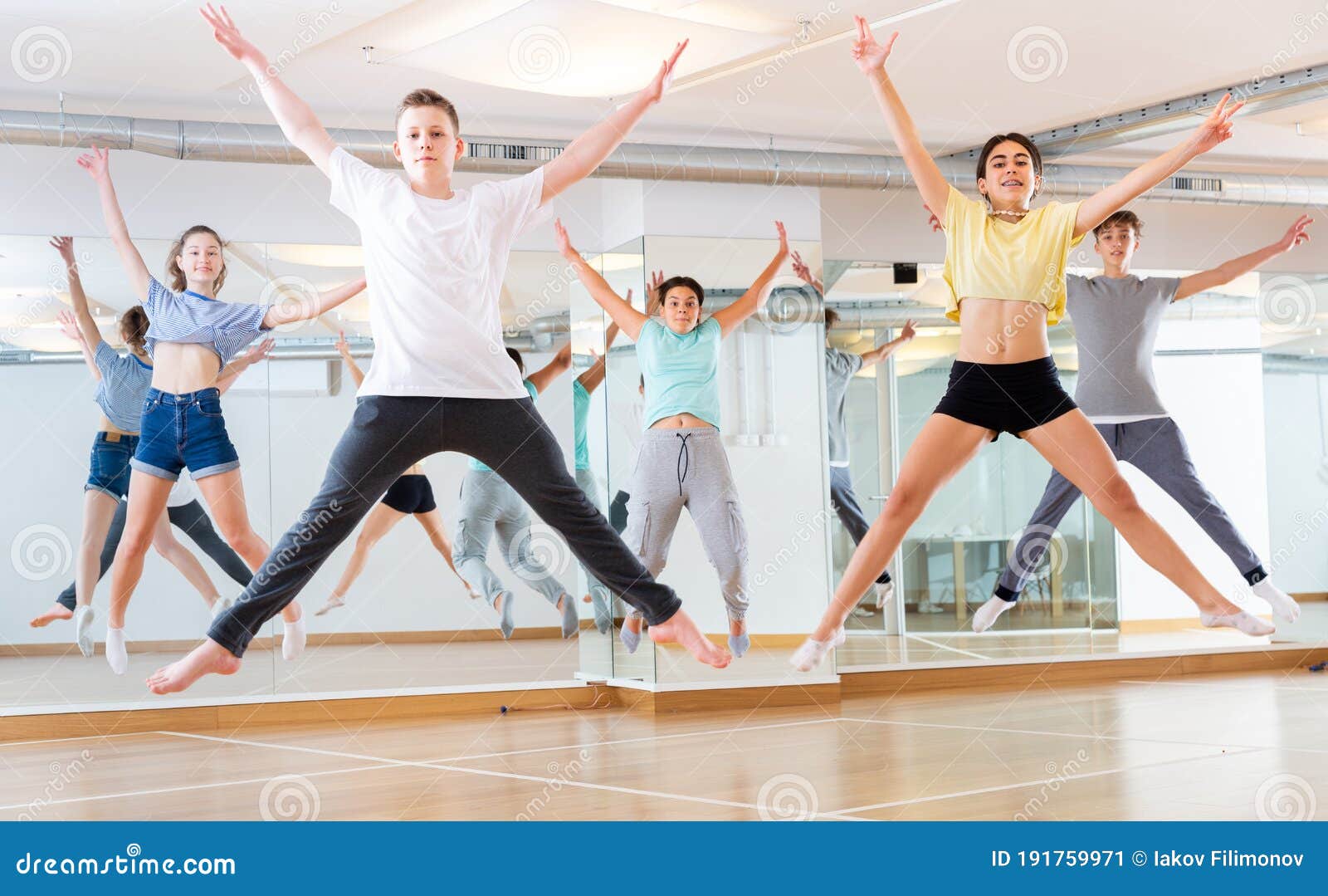 Group of Young Dancers Jumping Together in Class Stock Image - Image of ...