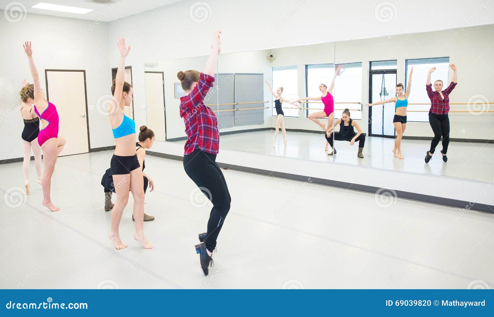 Group of Young Dancers Practicing in Front of Mirror Stock Photo ...