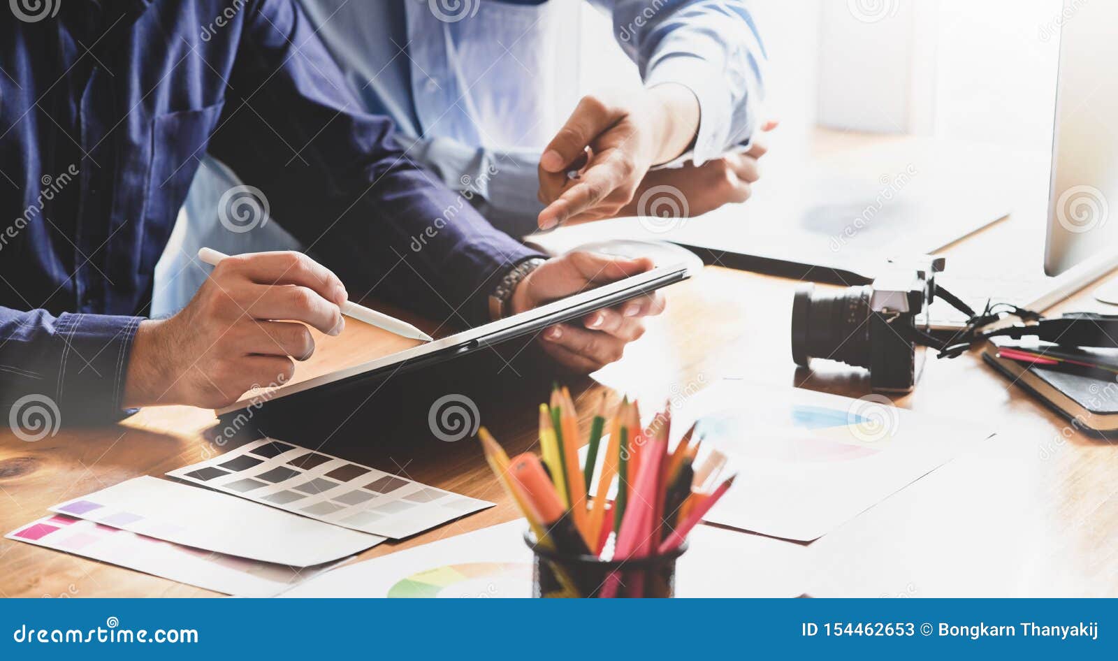 A Group of Young Designer Discussing the Ideas Stock Image - Image of ...