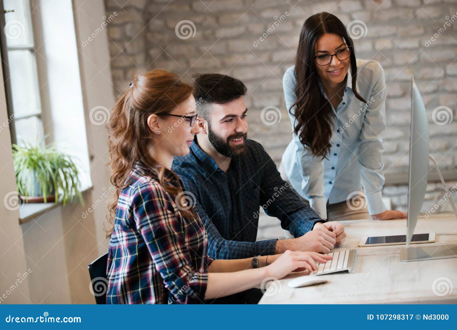 Group of Young Designers Working As Team Stock Image - Image of ...
