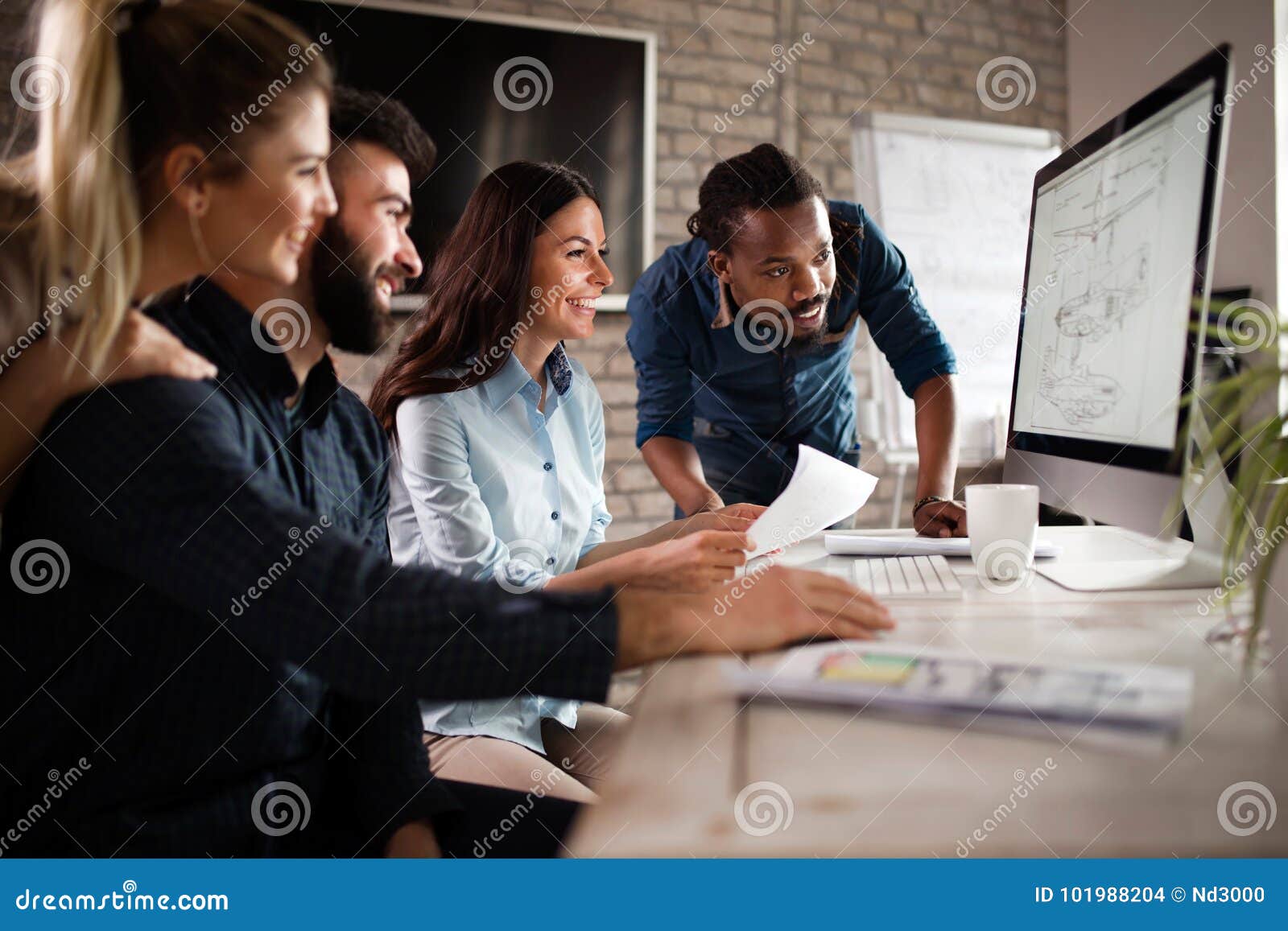 Group of Young Designers Working As Team Stock Photo - Image of ...
