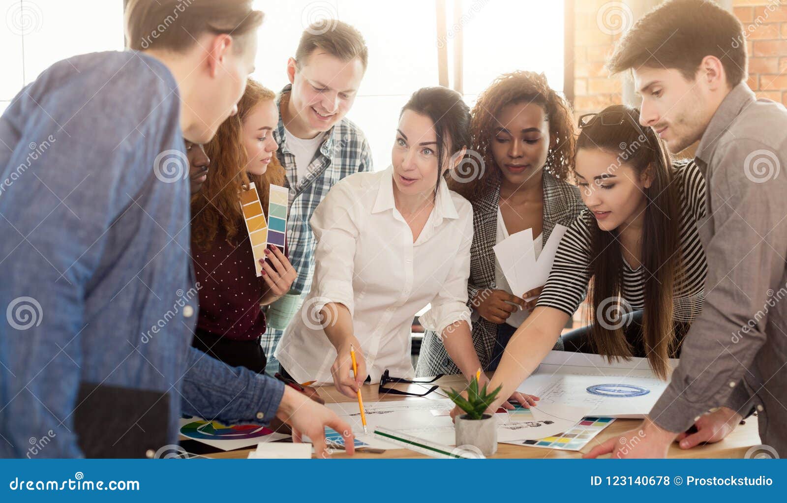 Group of Young Designers Working with Project Stock Photo - Image of ...