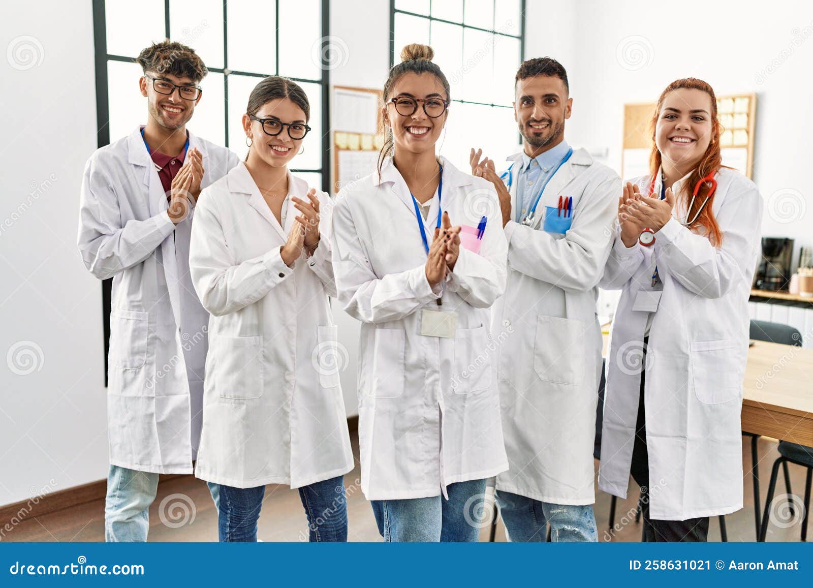 Group of Young Doctor Smiling Happy and Clapping Standing at the Clinic ...