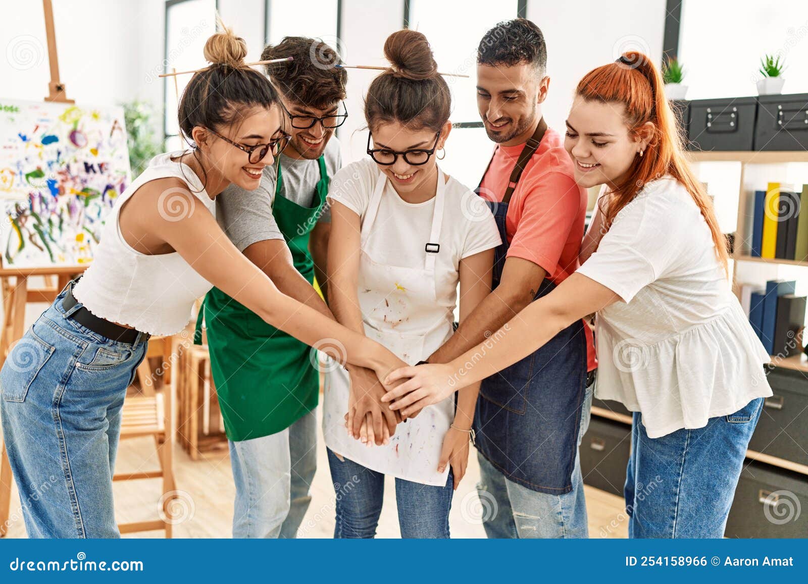Group of Young Draw Students Smiling Happy Standing with Hands Together ...