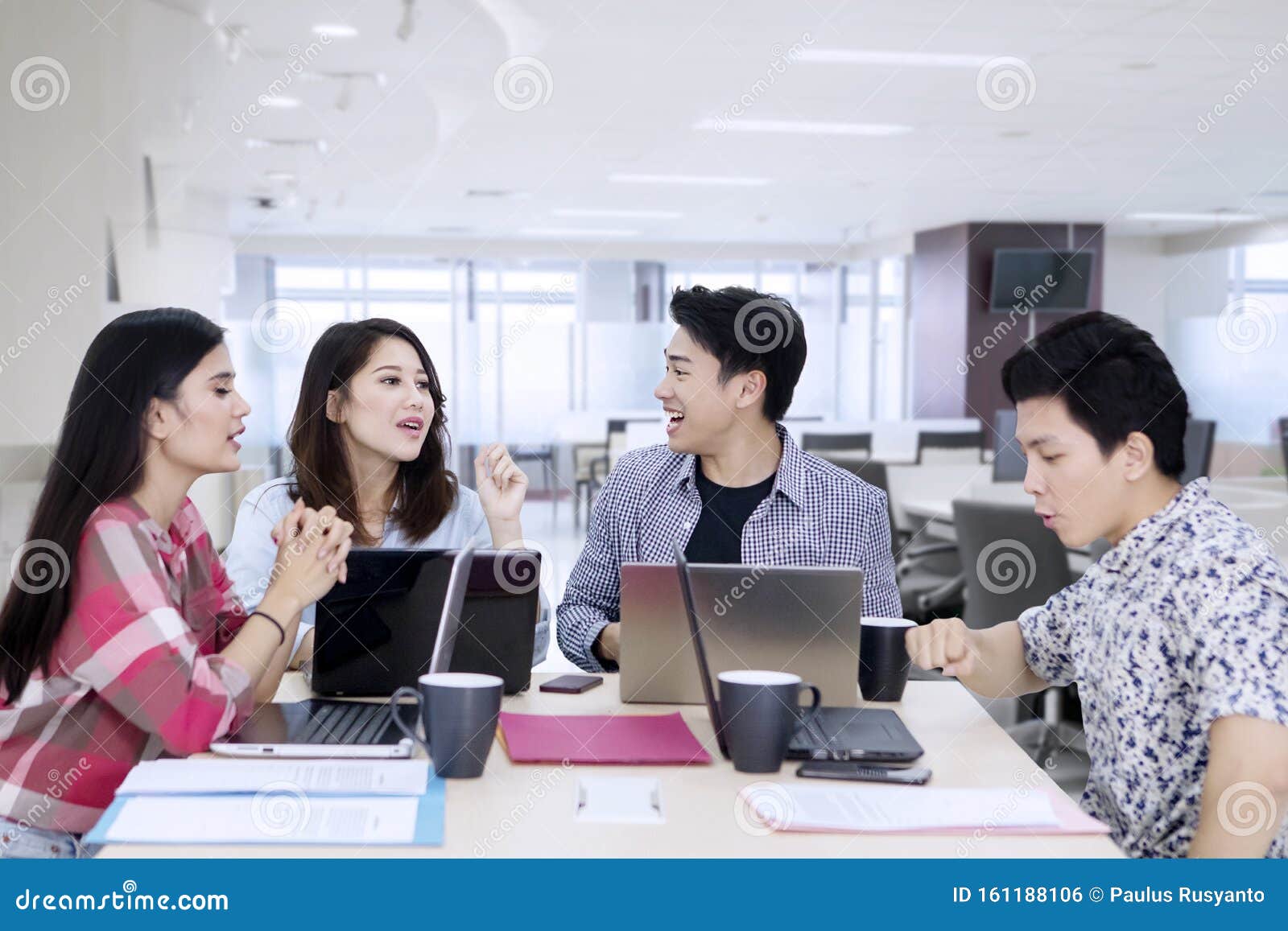 Group of Young Employees Brainstorming in Office Stock Photo - Image of ...