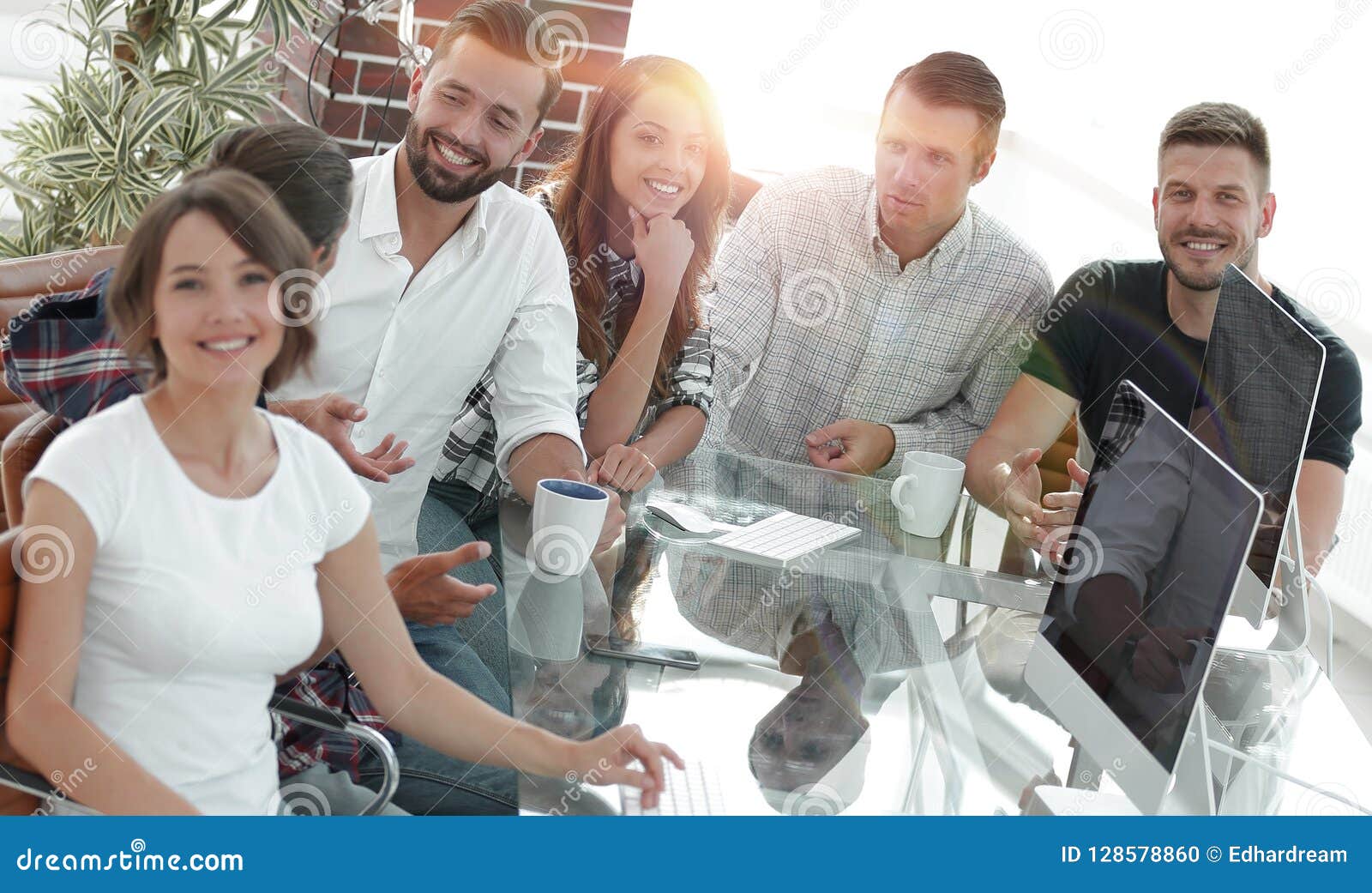 Group of Young Employees Discussing Ideas Stock Photo - Image of laptop ...