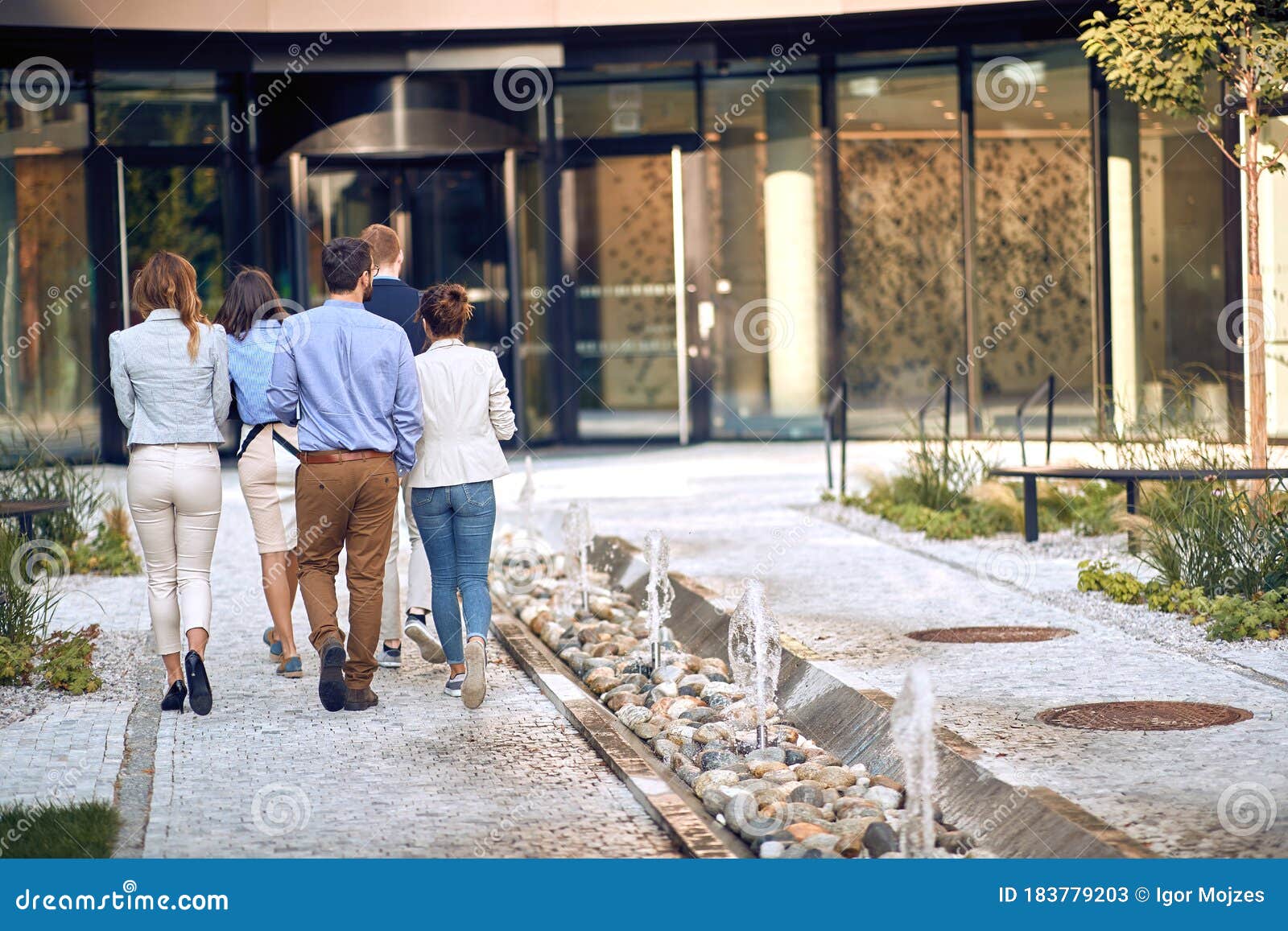 Group of Young Employees Entering the Business Building Stock Image ...