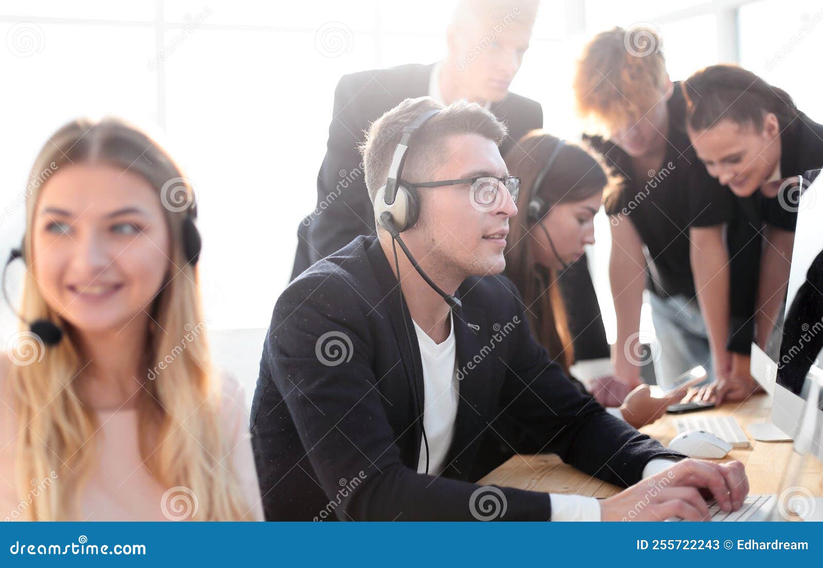 Group of Young Employees in the Workplace. Stock Image - Image of ...