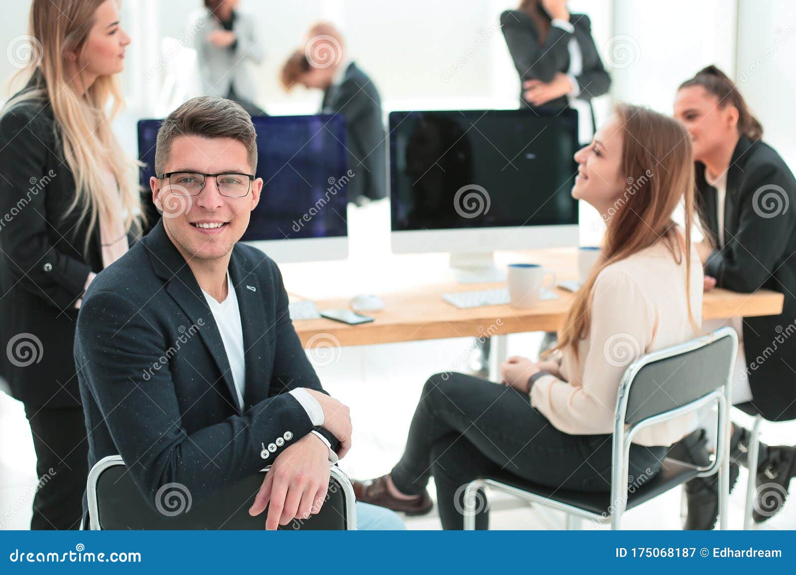 Group of Young Employees in the Workplace Stock Image - Image of ...